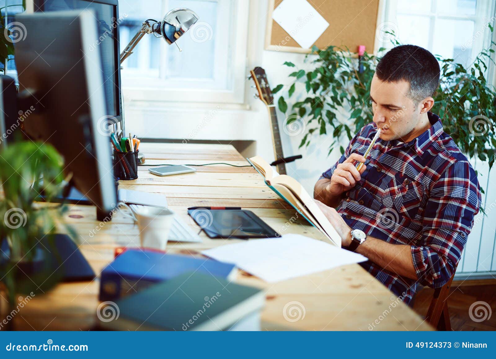 Man working at home stock image. Image of table, indoors - 49124373