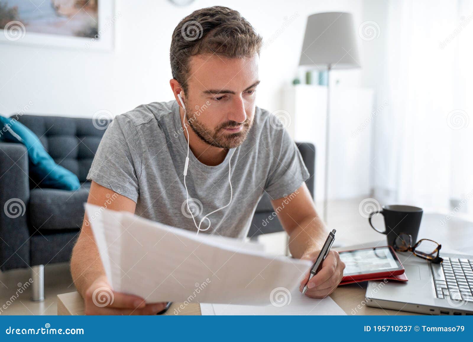Man Working from Home Using Computer and Internet Connection Stock ...
