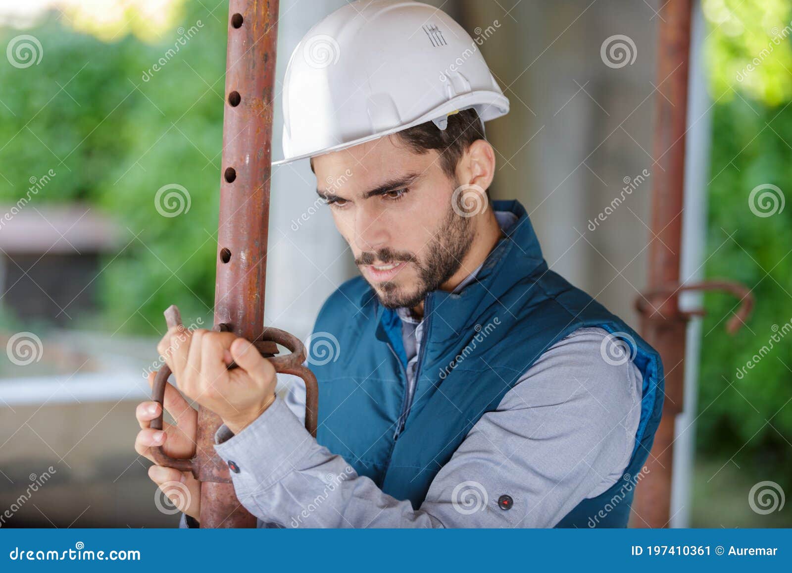 Man Working on Industrial Pipe Stock Image - Image of concentration ...