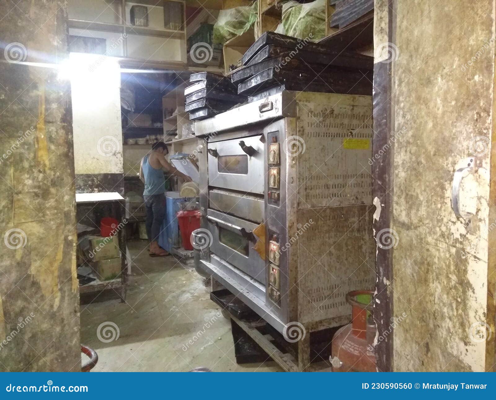 Man Working Inside a Kitchen of a Bakery Editorial Image - Image of ...