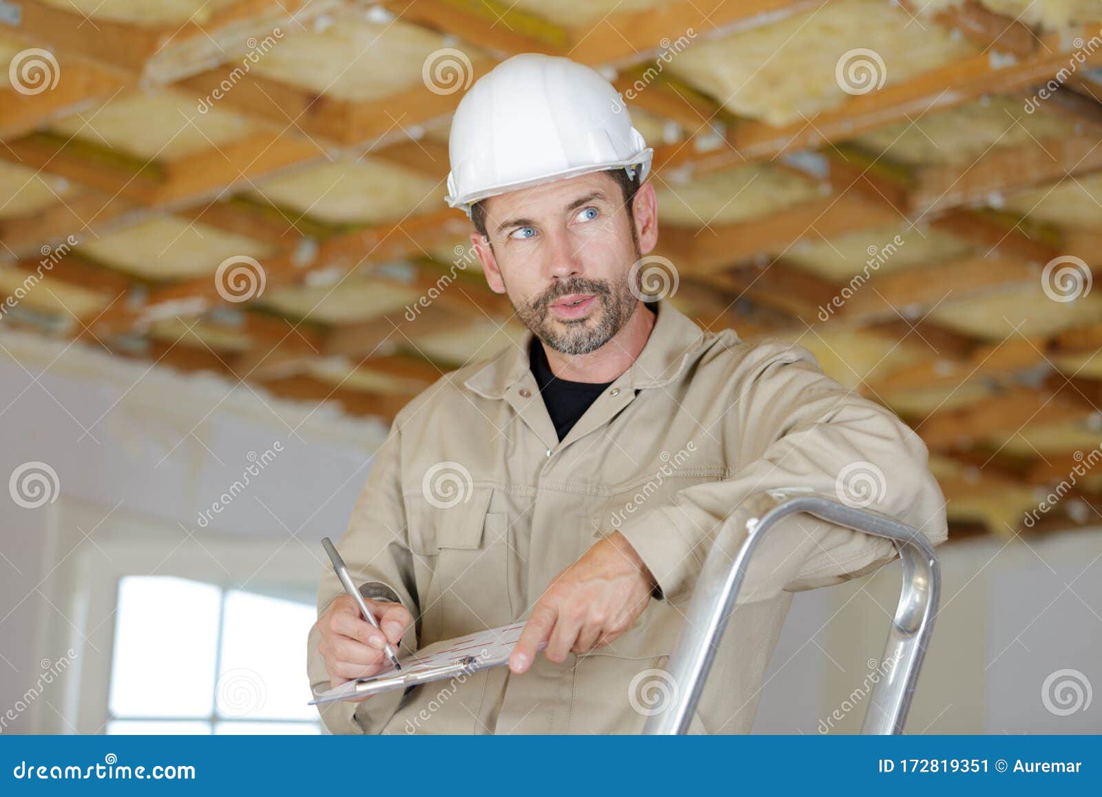 Man working on ladder stock image. Image of construction - 172819351