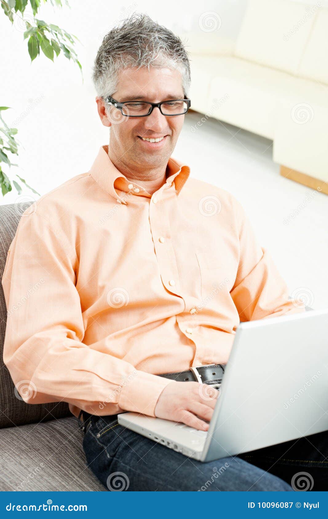Man working on laptop stock image. Image of concentration - 10096087