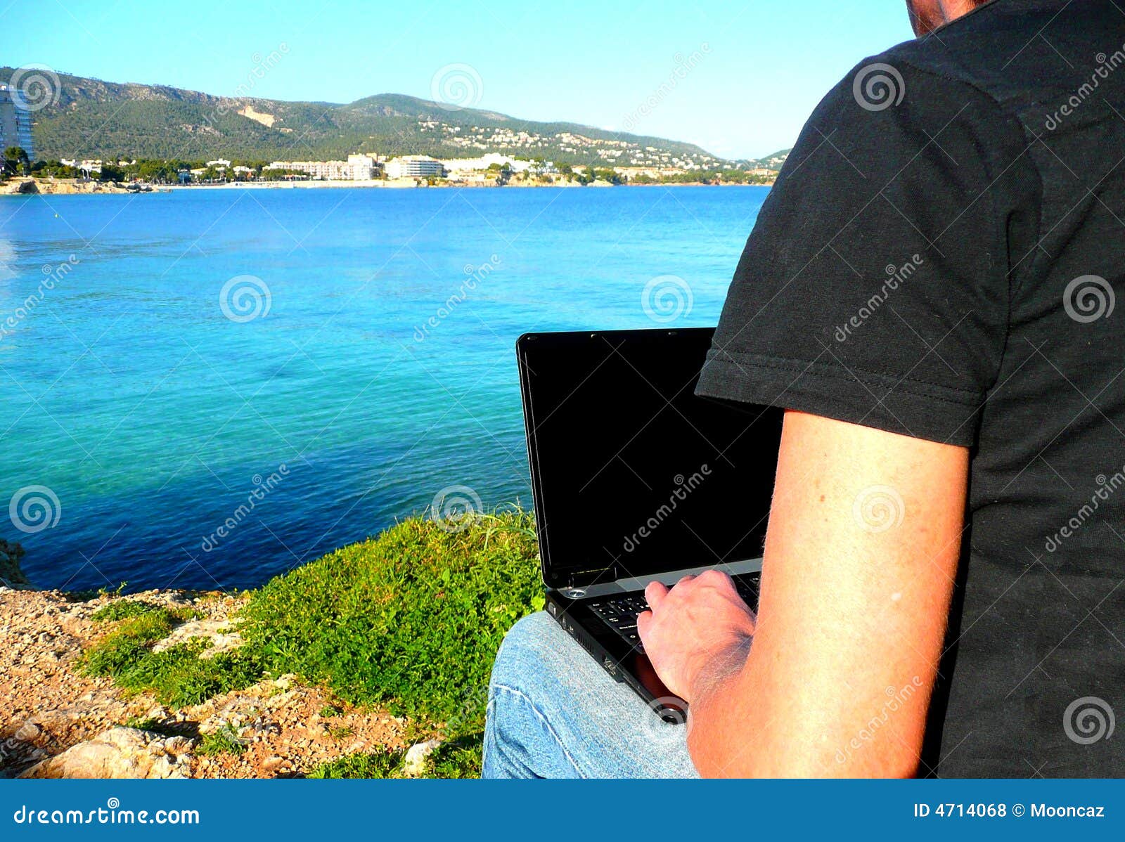 Man working on a laptop stock photo. Image of holiday - 4714068