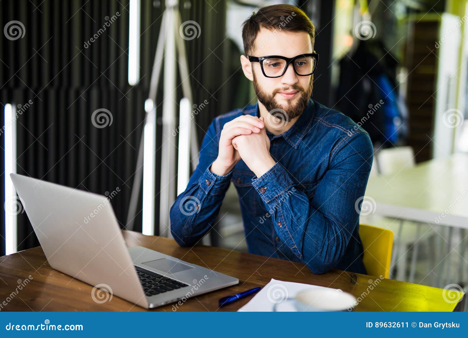 Man Working at Laptop in Contemporary Office. Look on Side Stock Image ...