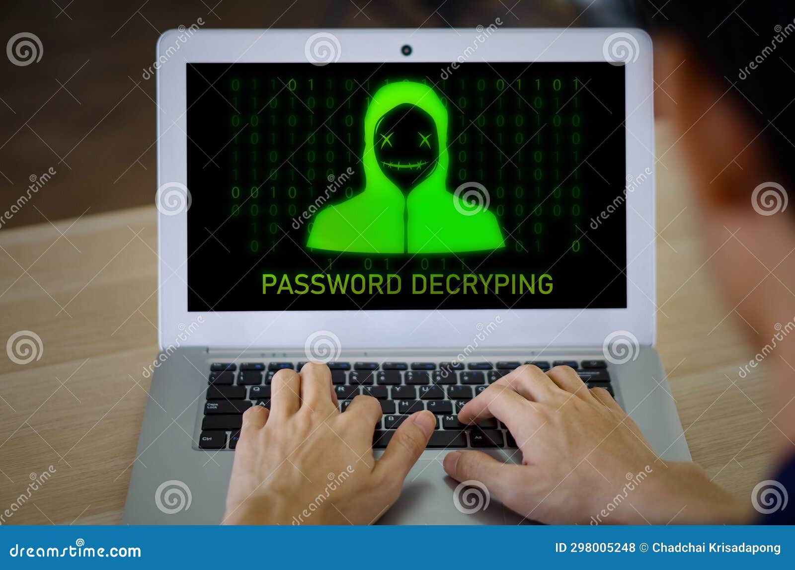 A Man is Working on a Laptop, Decrypting a Password Displayed on the ...