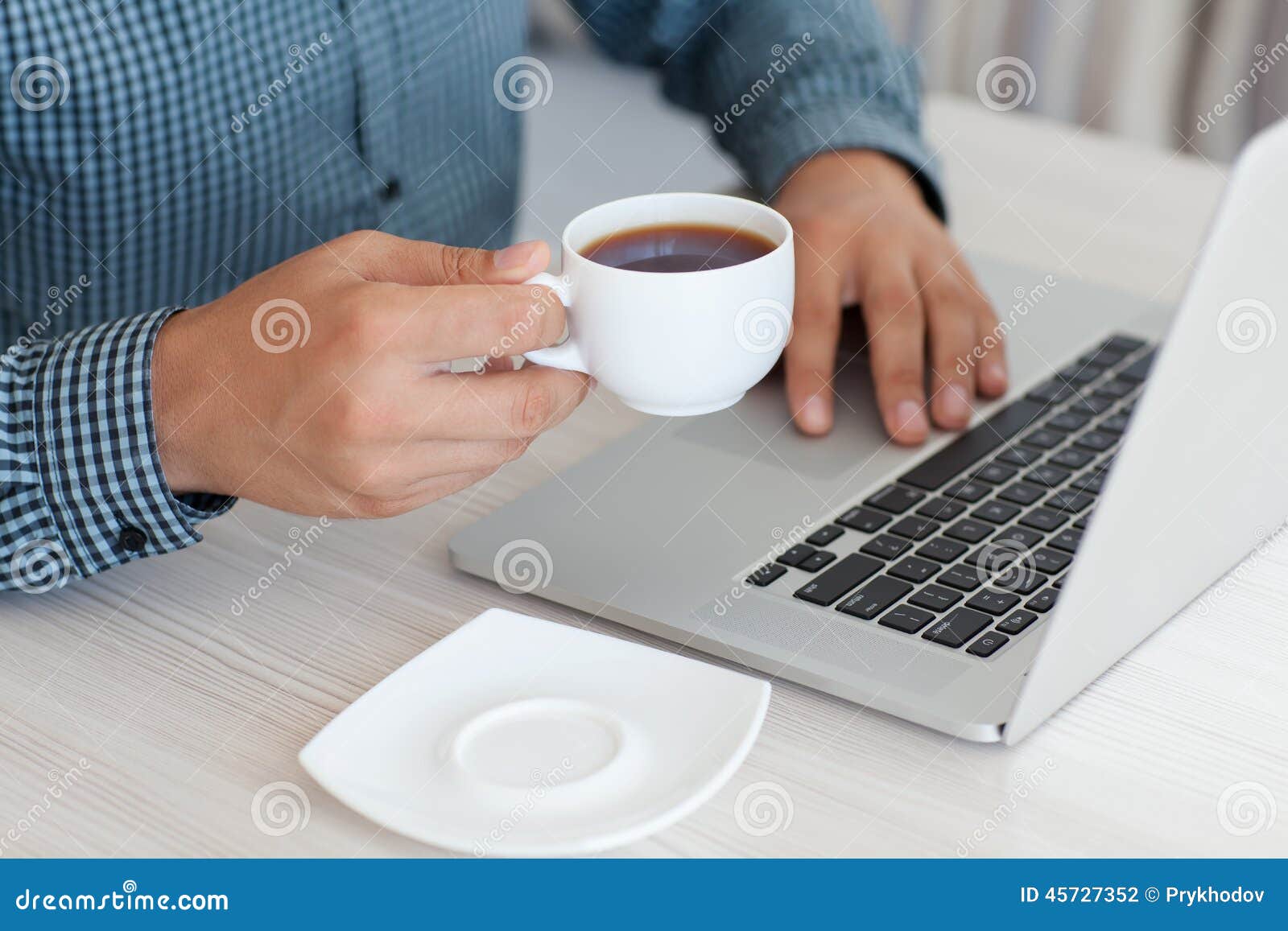 Man Working at a Laptop and Drinking Coffee Editorial Photography ...