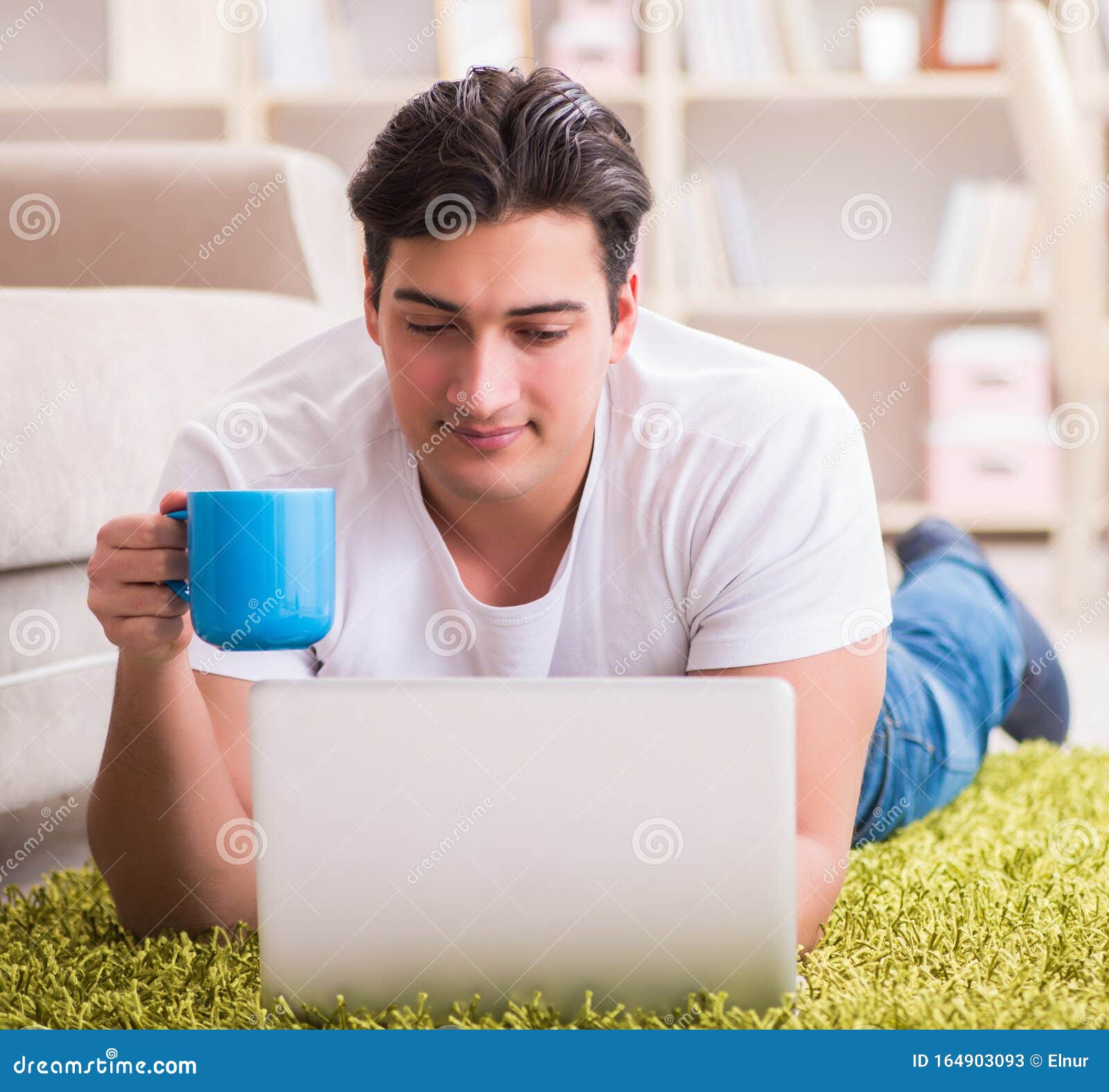 The Man Working on Laptop at Home on Carpet Floor Stock Image - Image ...