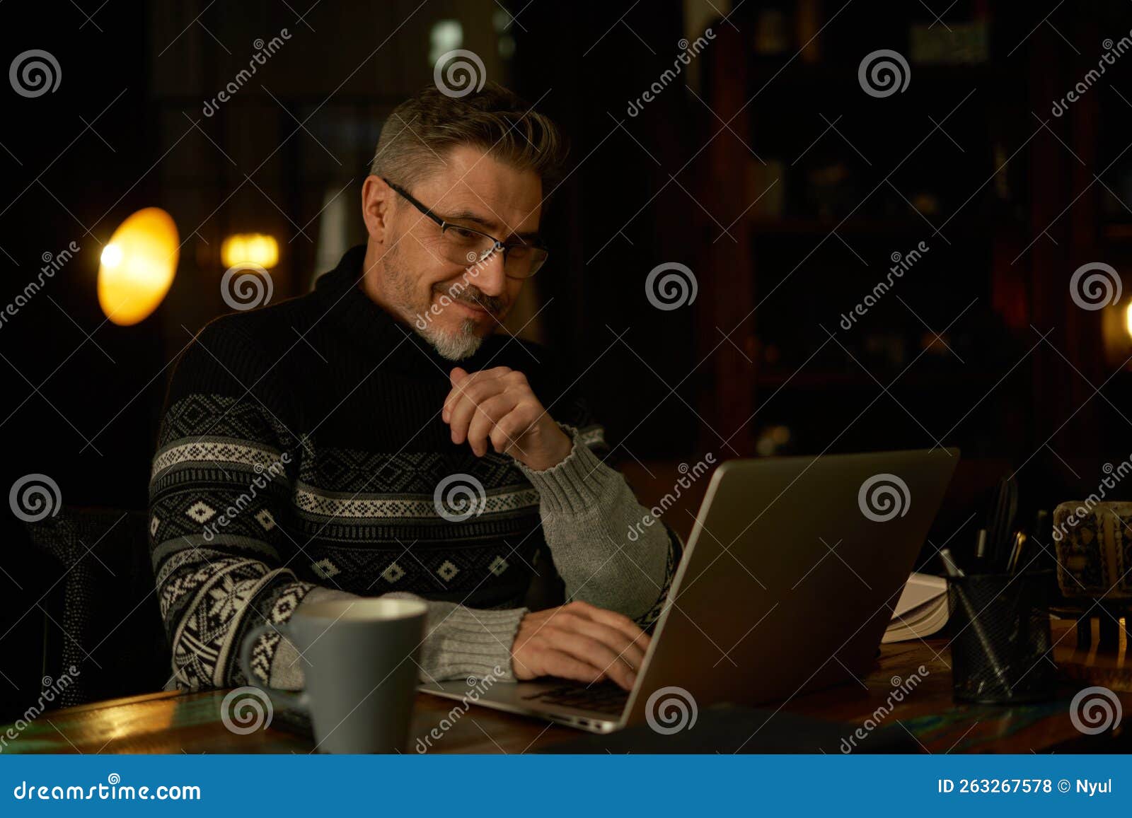 Man Working with Laptop in Home Office Sitting at Desk Stock Photo ...