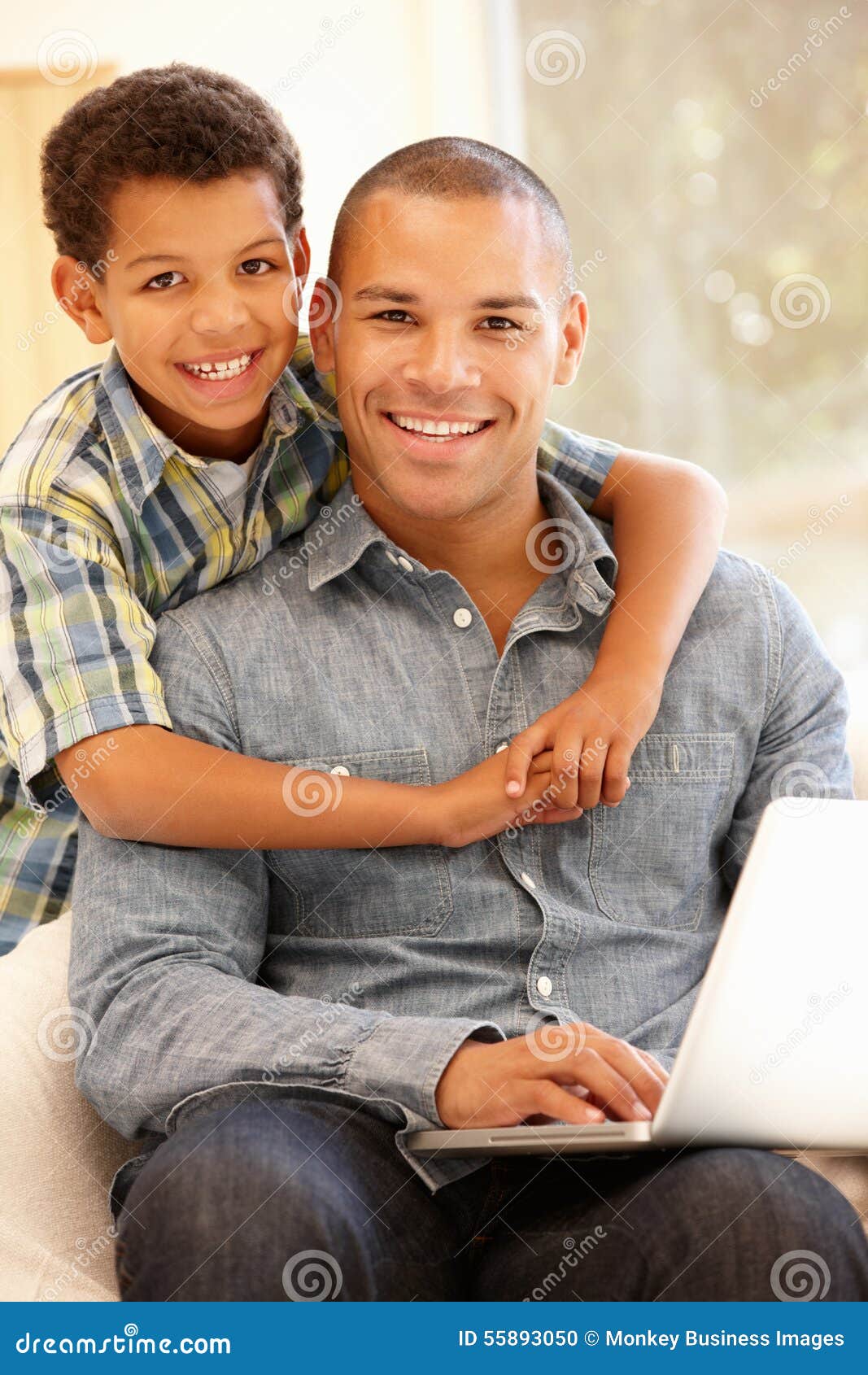 Man Working on Laptop at Home with Son Stock Photo - Image of people ...