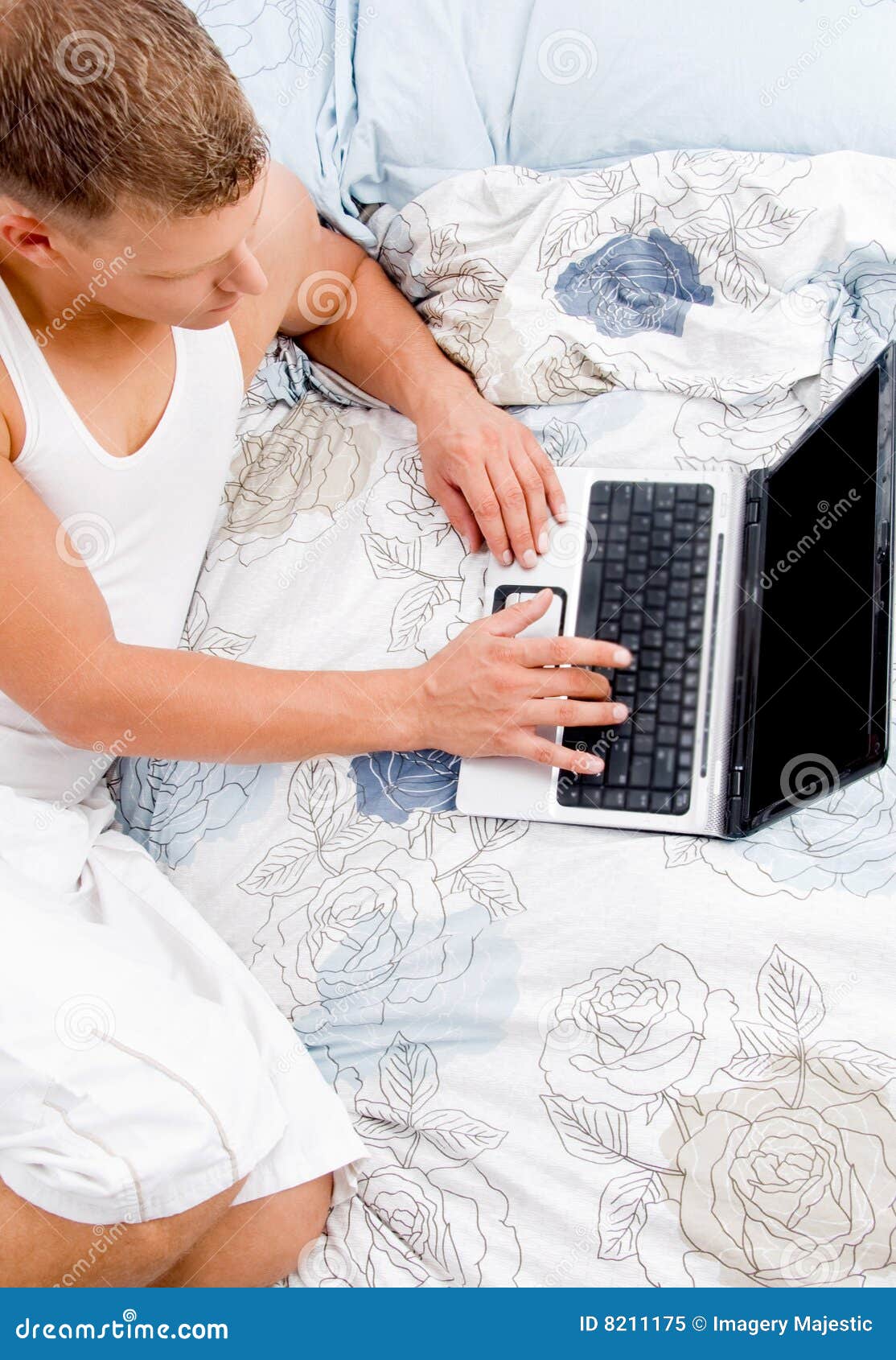 Man Working on Laptop Laying in Bed Stock Image - Image of posing ...