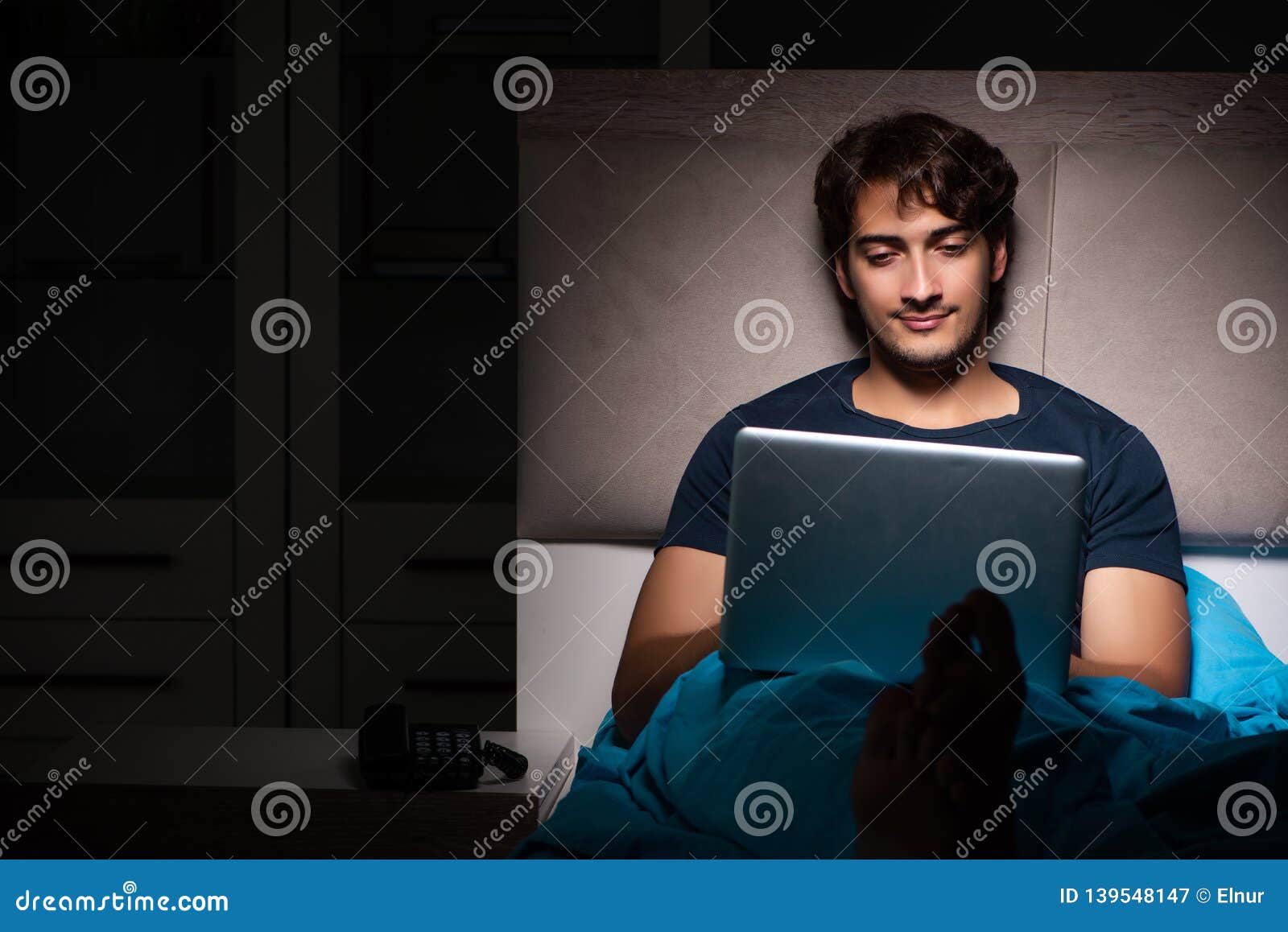 The Man Working on Laptop at Night in Bed Stock Image - Image of ...