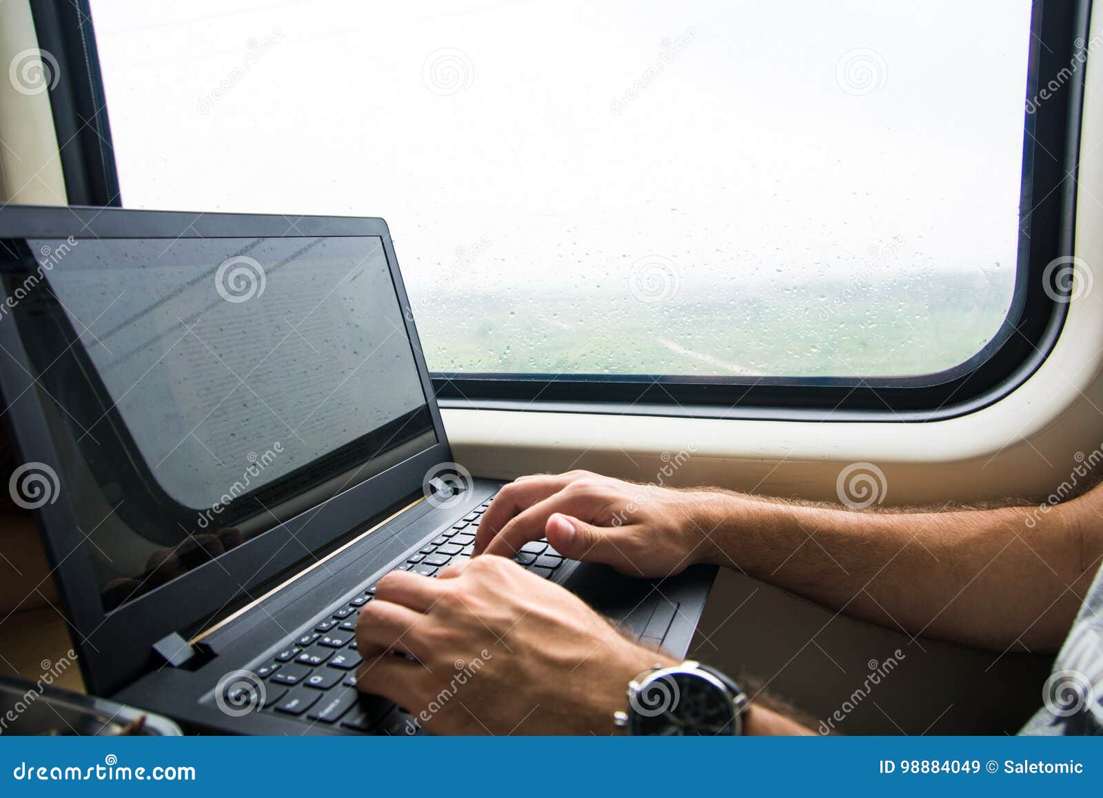 Man Working on Laptop in a Train Stock Image - Image of passenger ...