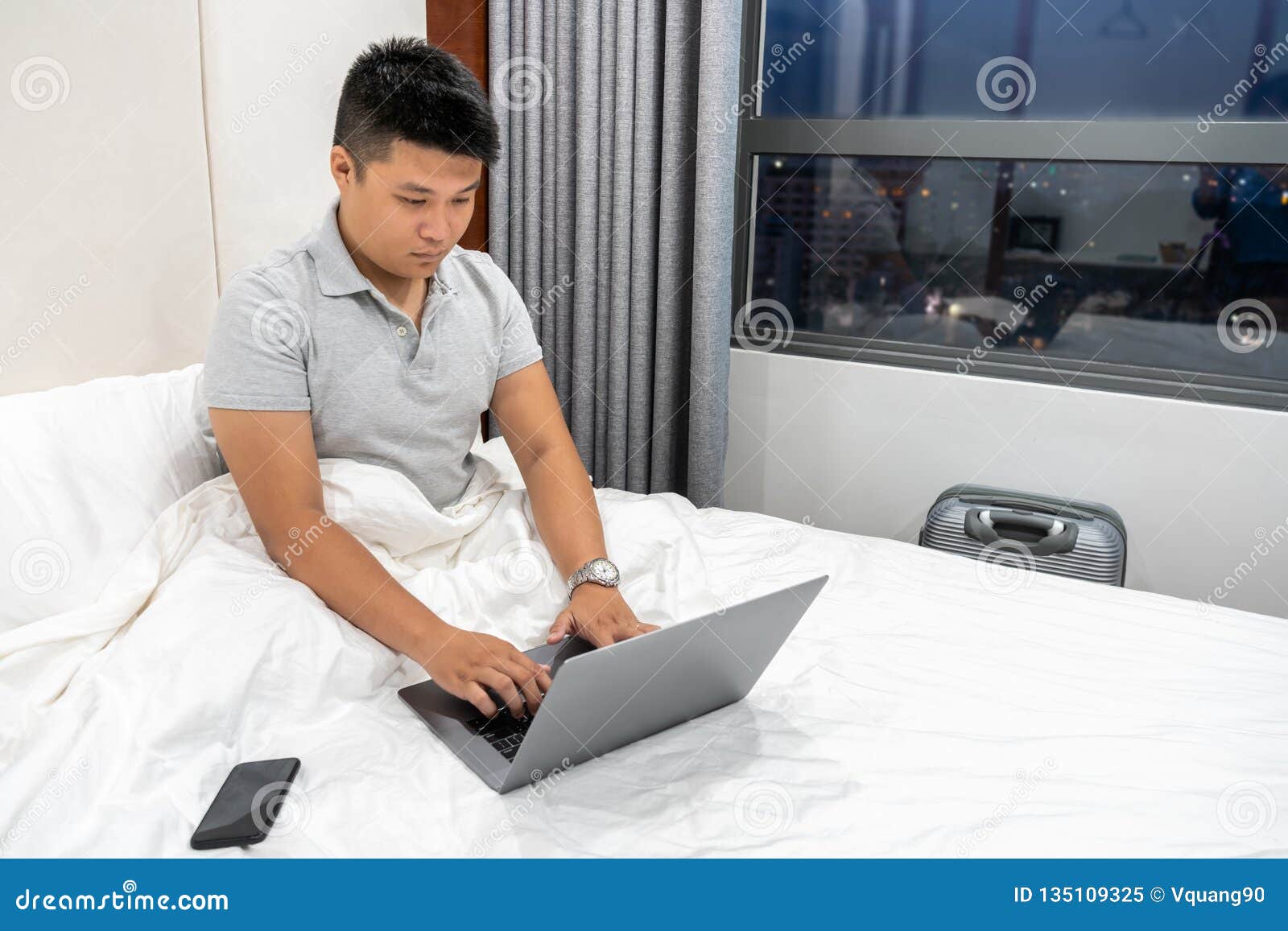 Man working late at night stock image. Image of indoors - 135109325