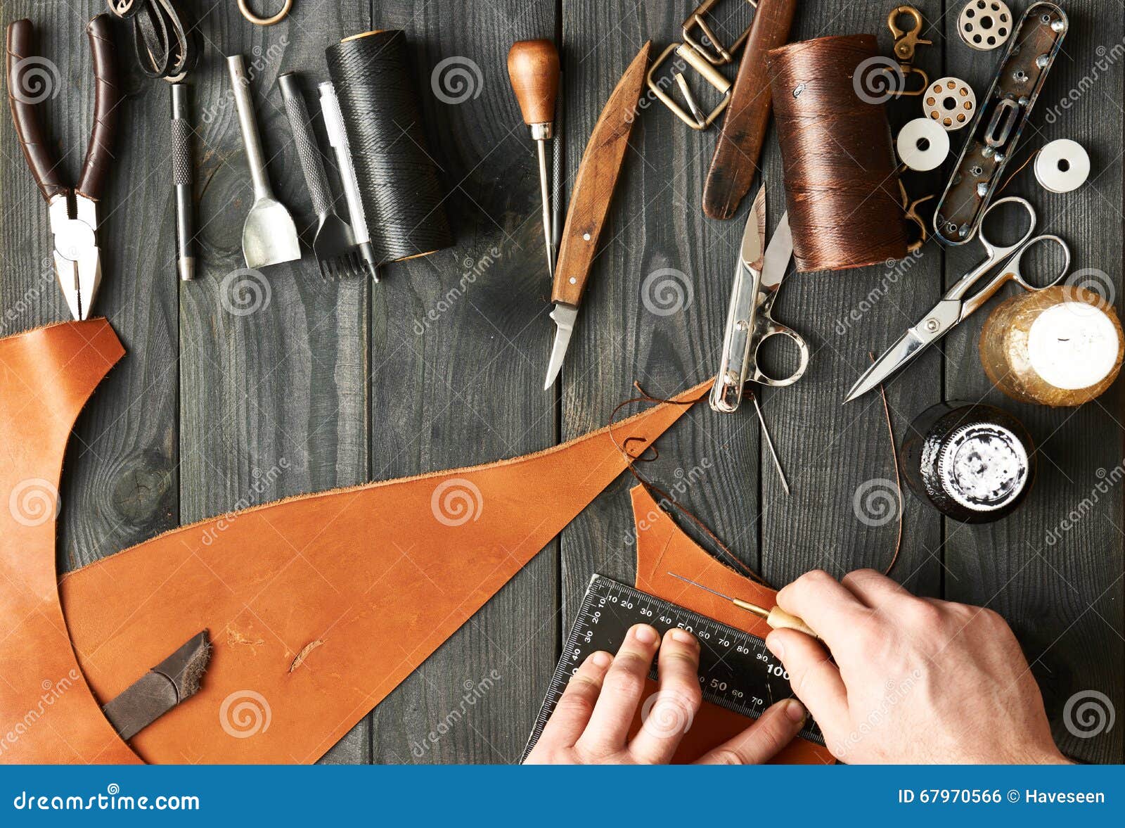 Man working with leather stock photo. Image of leathercraft - 67970566