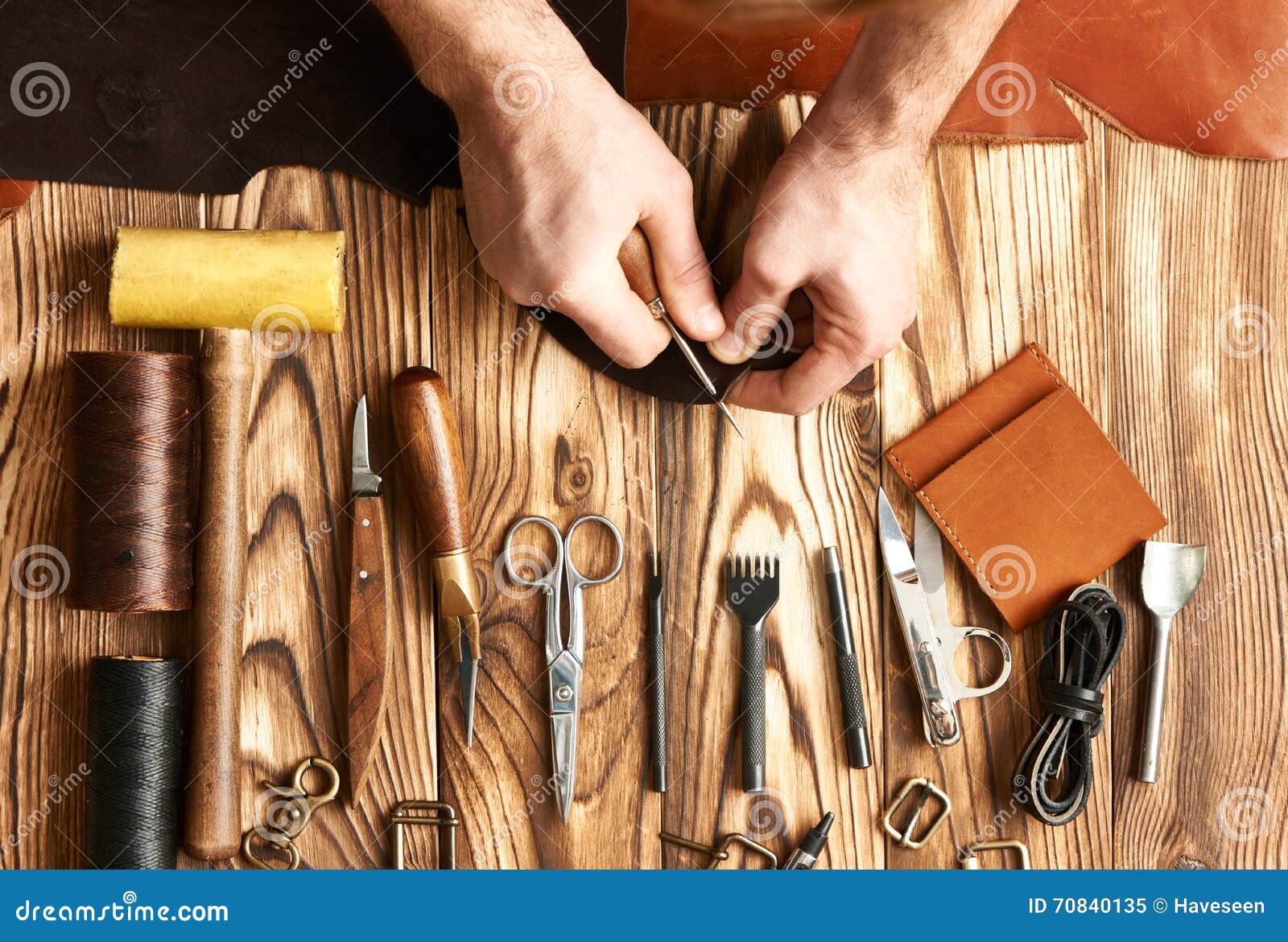 Man working with leather stock image. Image of shop, table - 70840135