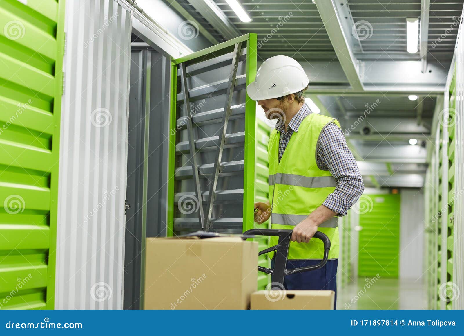 Man working with load stock photo. Image of machinery - 171897814