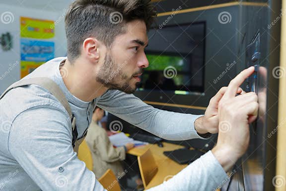 Man working on machine stock photo. Image of bore, metalwork - 278506608