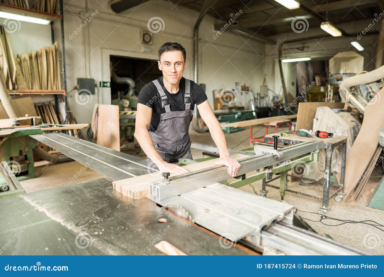 Man Working on a Machine in a Factory Stock Photo - Image of sliding ...