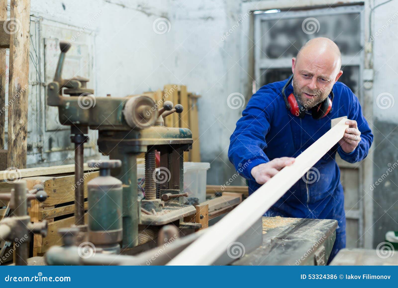 Man Working on a Machine at Wood Workshop Stock Photo - Image of hold ...