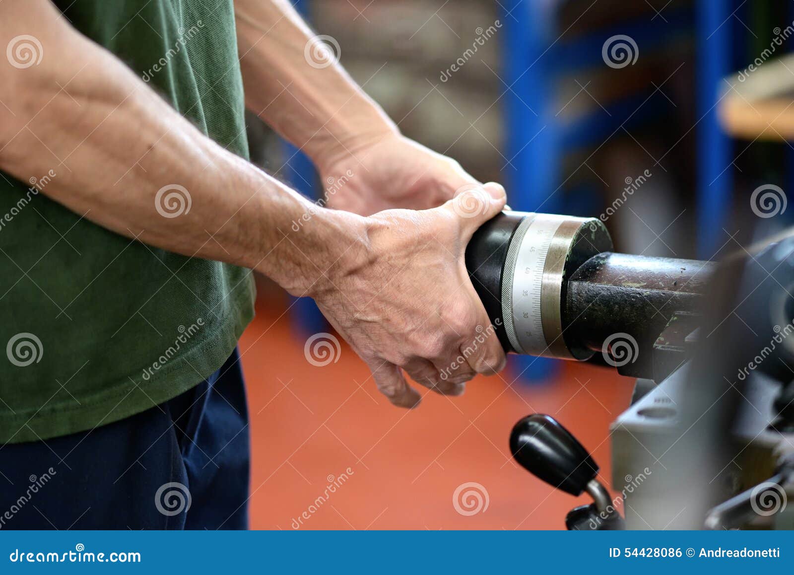Man Working on Machinery in a Workshop Stock Photo - Image of workman ...