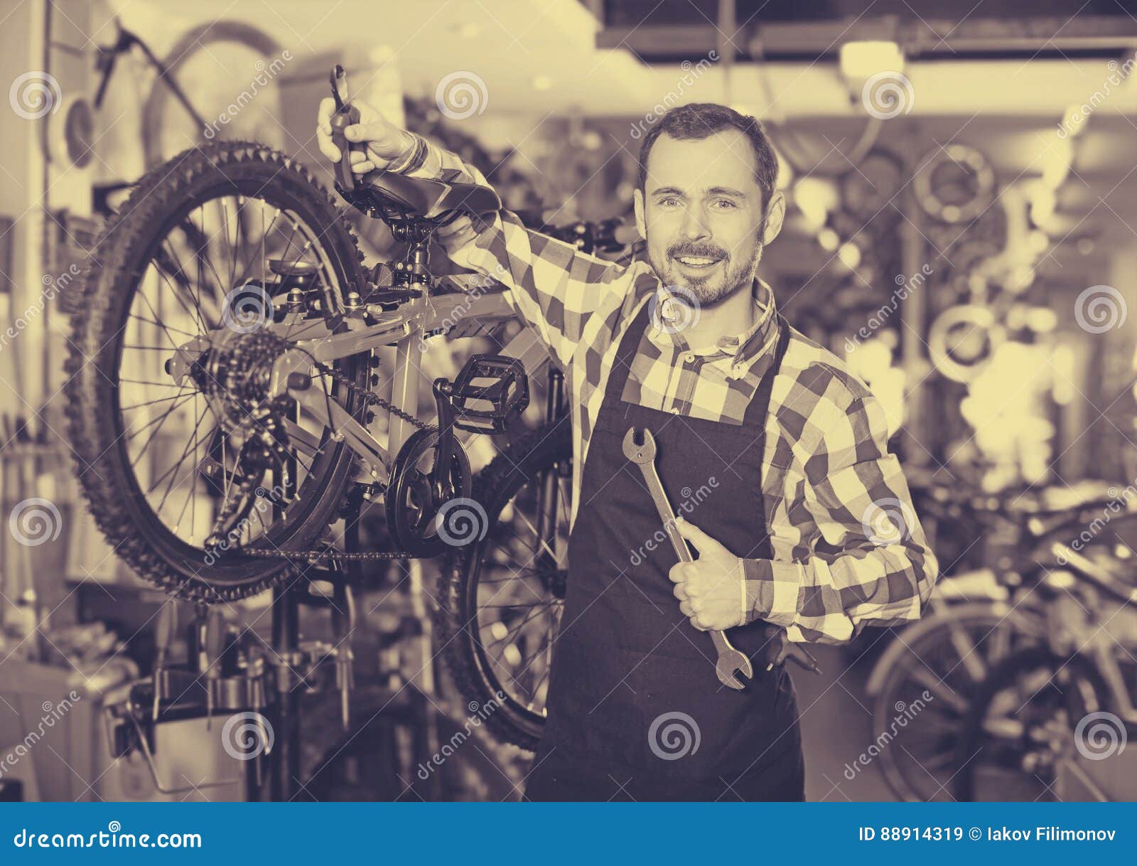 Man Working on Master Mechanic Assembling Bicycle Equipment Stock Image ...