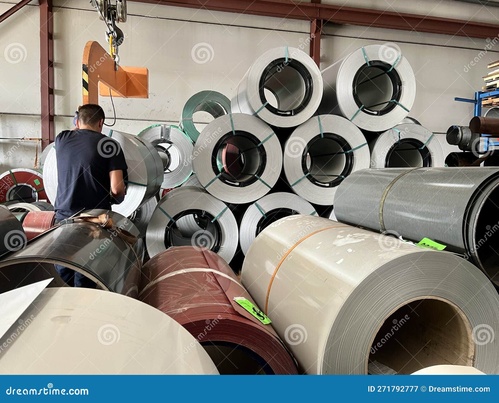 Man Working in a Metal Coil Industry. Worker Person in a Metal Industry ...