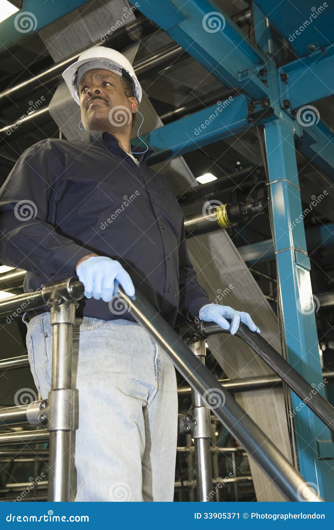 Man Working in Newspaper Factory Stock Image - Image of boomer, away ...