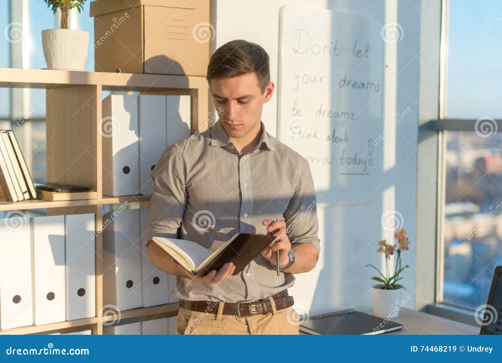 Man Working in Office, Planning Work Tasks, Writing Down His Schedule ...