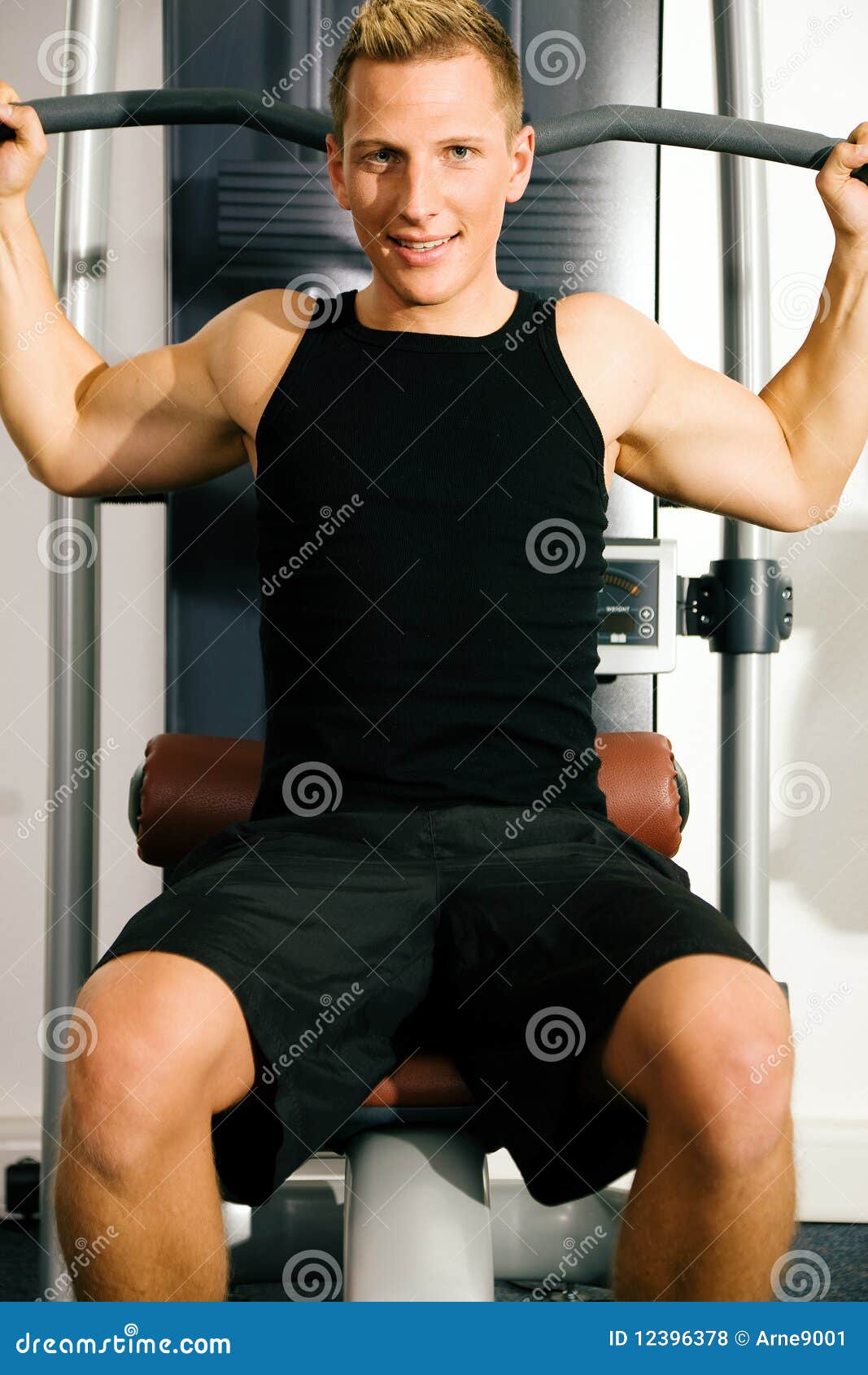 Man working out in gym stock photo. Image of athlete - 12396378