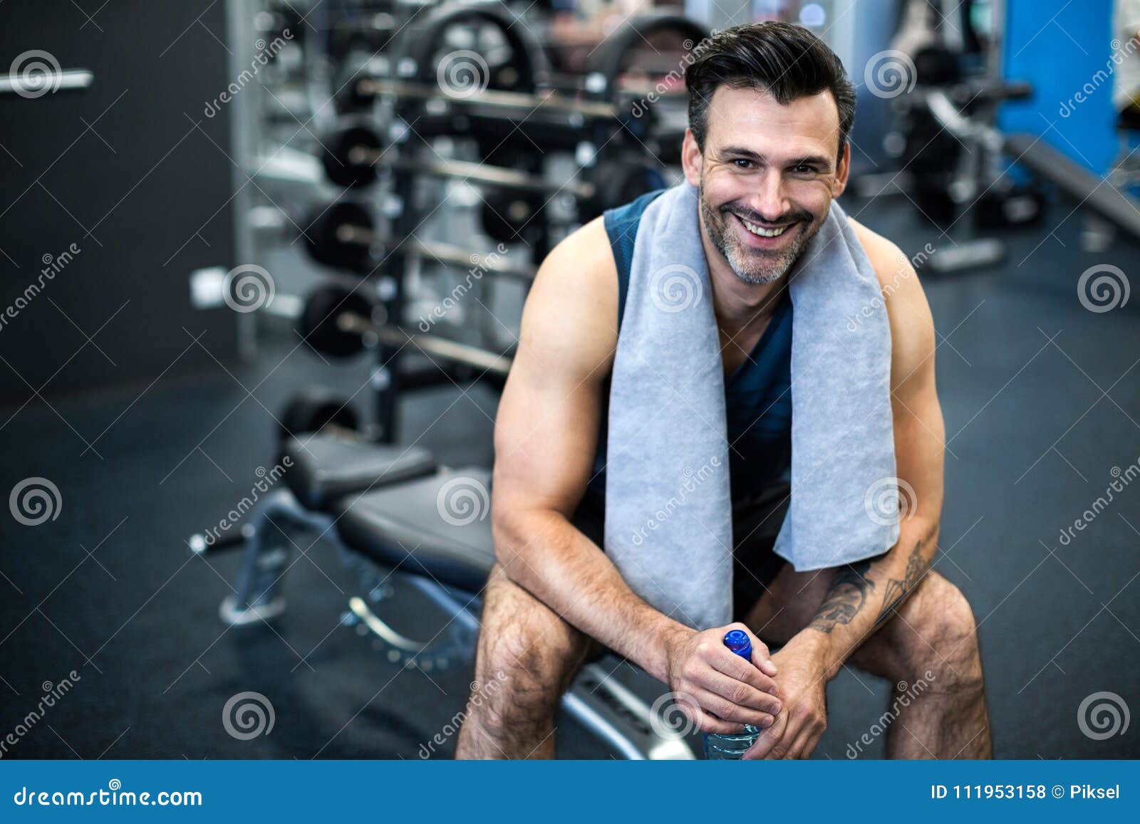 Man working out in gym stock photo. Image of biceps - 111953158