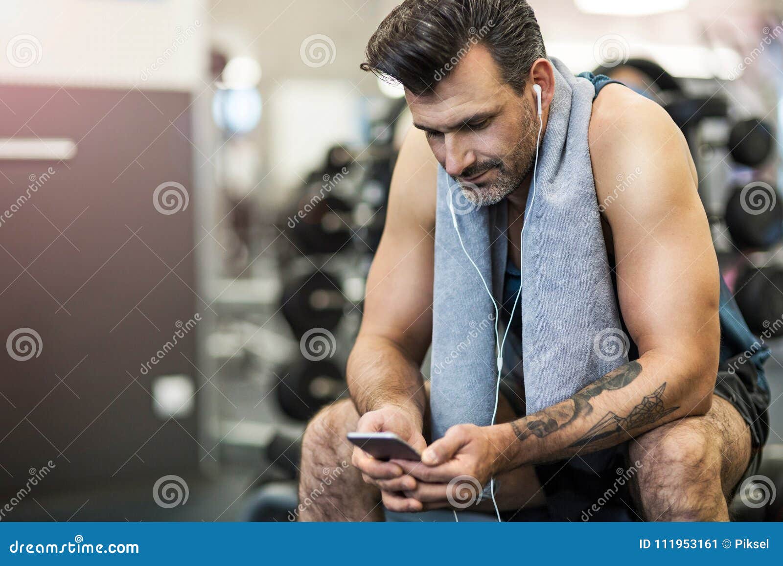 Man working out in gym stock image. Image of active - 111953161
