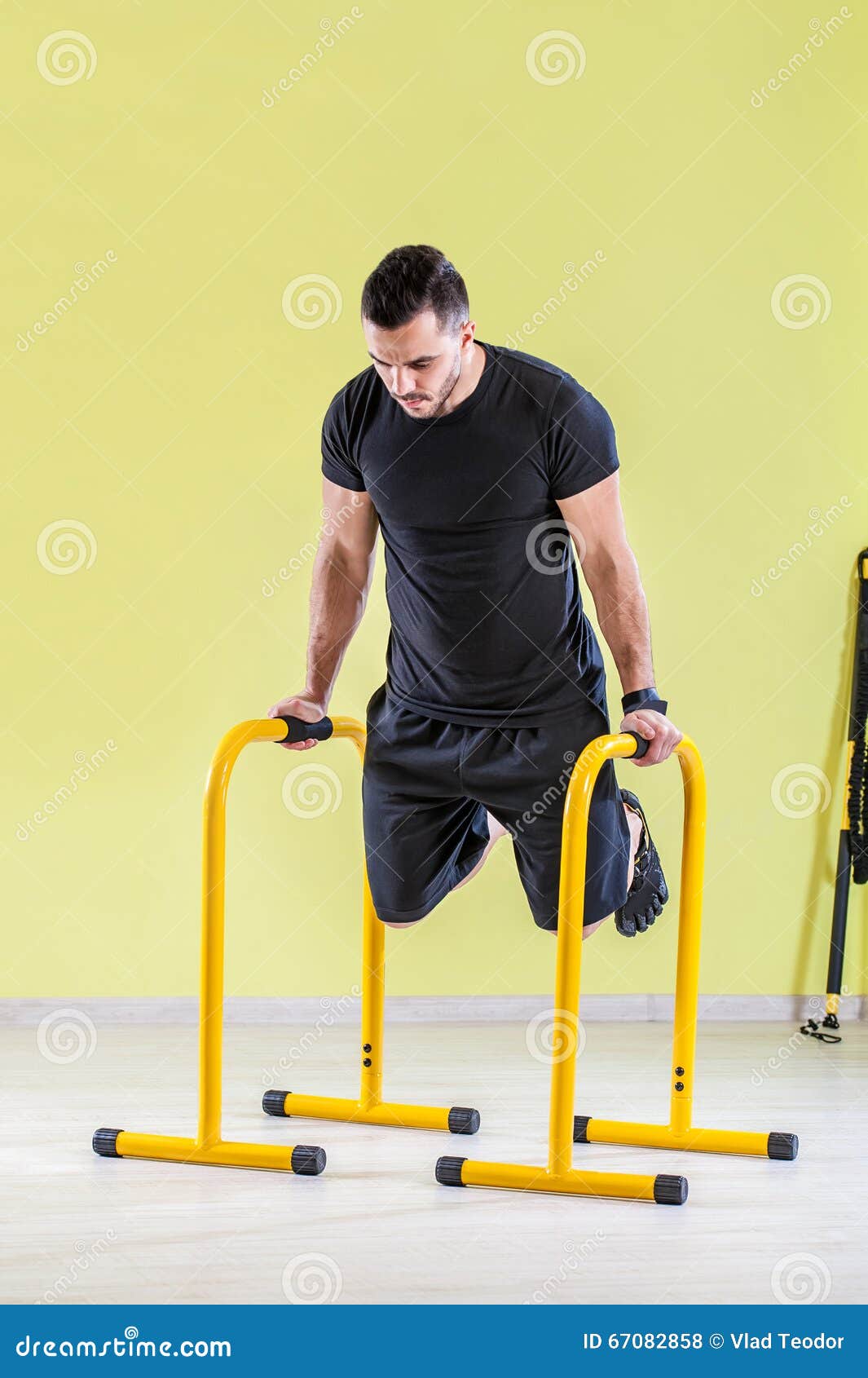 Man working out at gym stock photo. Image of exercise - 67082858