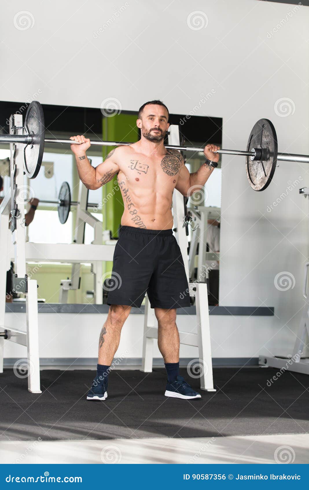 Man Doing Heavy Weight Exercise with Barbell Stock Photo - Image of ...