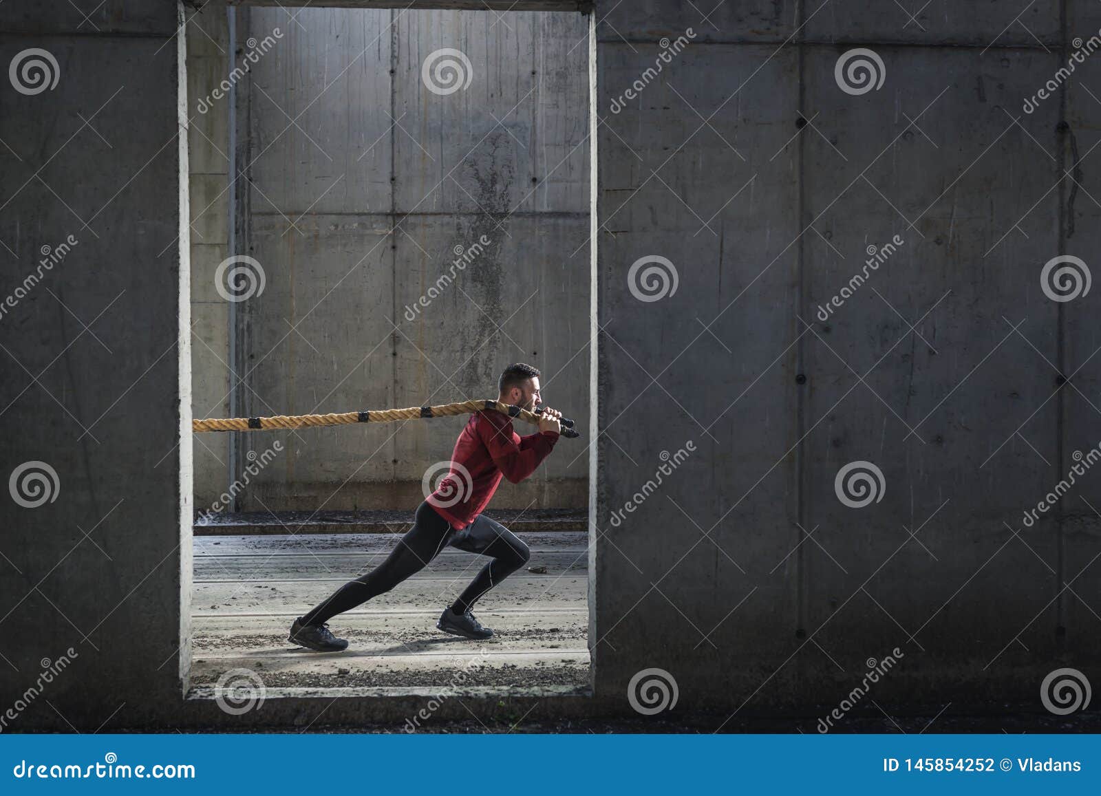 Man Working Out Puling Battle Ropes Stock Photo - Image of person, copy ...