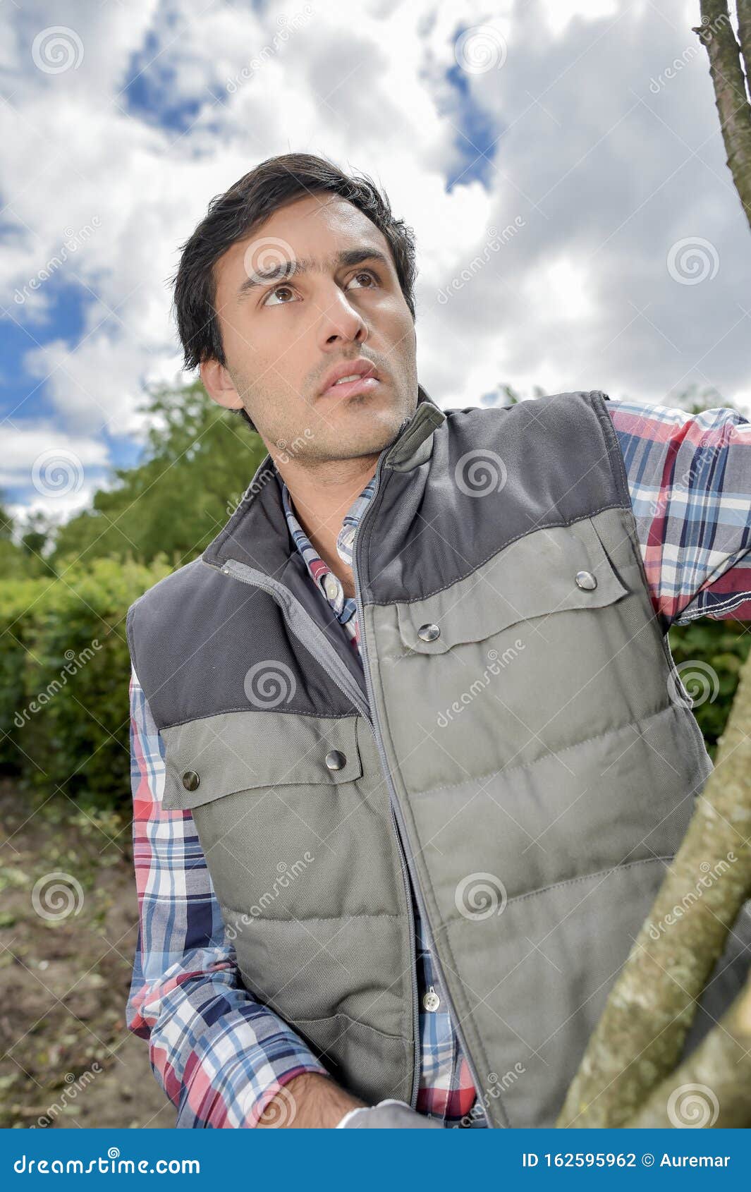 Man Working Outdoors with Branches Stock Photo - Image of sleevless ...