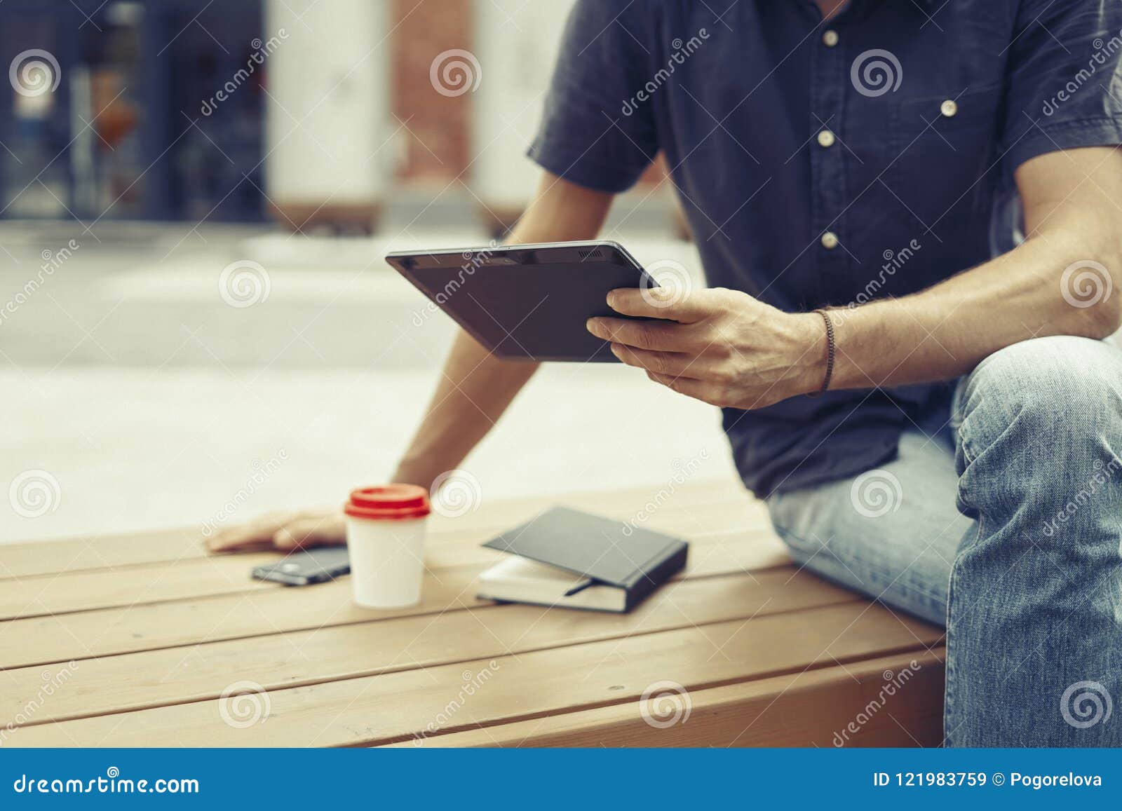 Man Working Outside in Park Using Modern Tablet, Notebook, Mobile Phone ...