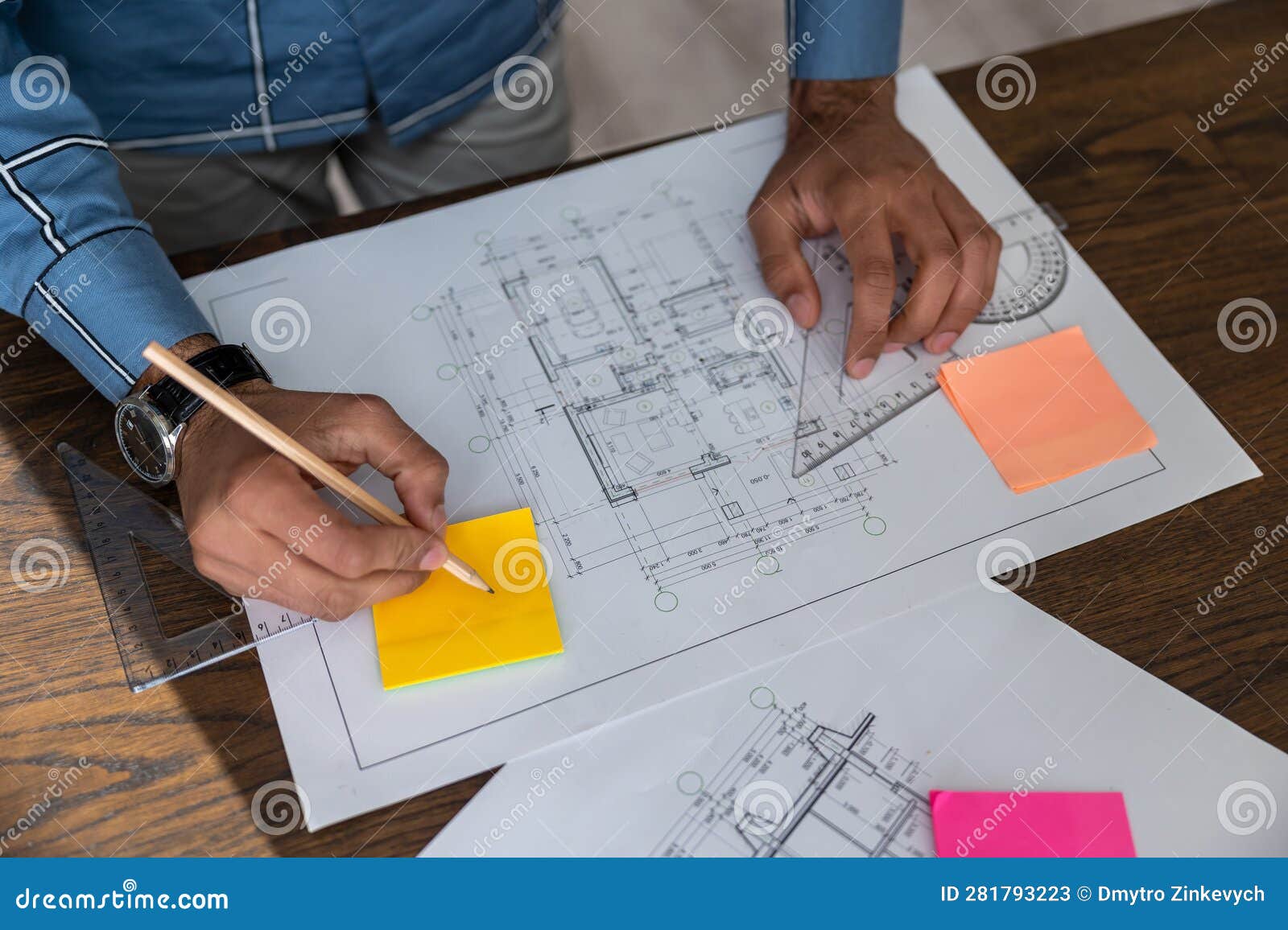 Man Working on Papers of the Construction Project Stock Image - Image ...