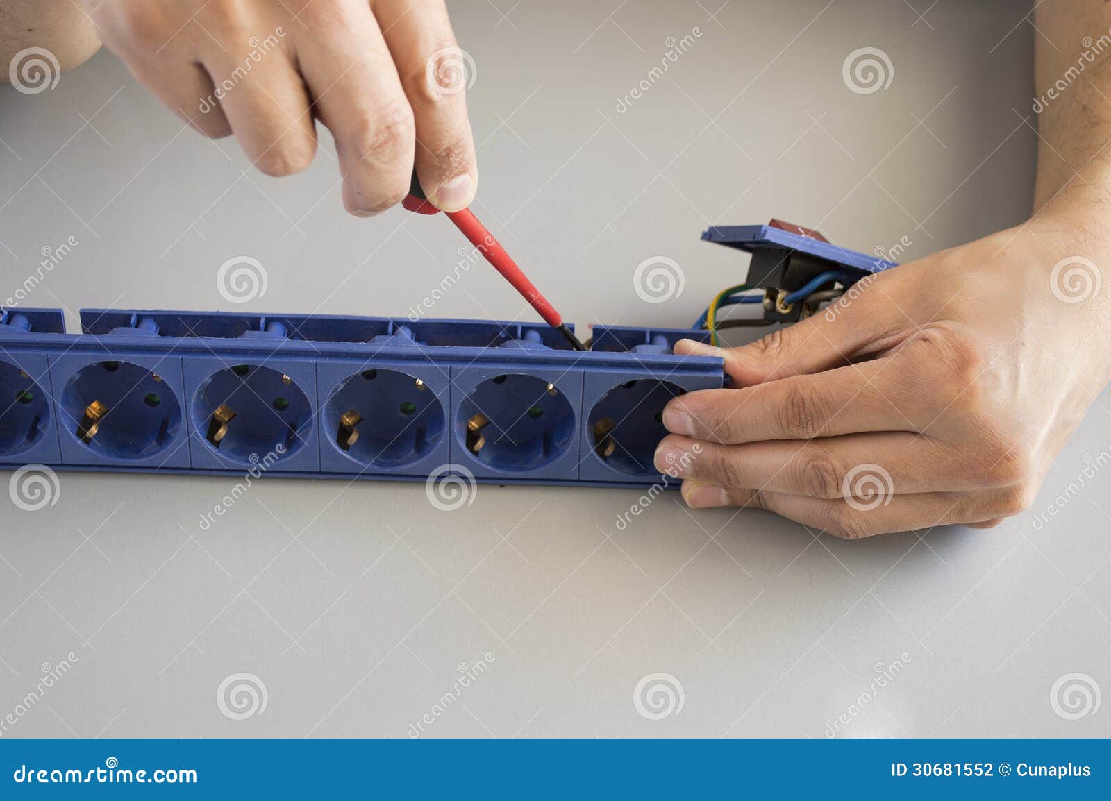 Man working on a plug stock photo. Image of human, fixing - 30681552