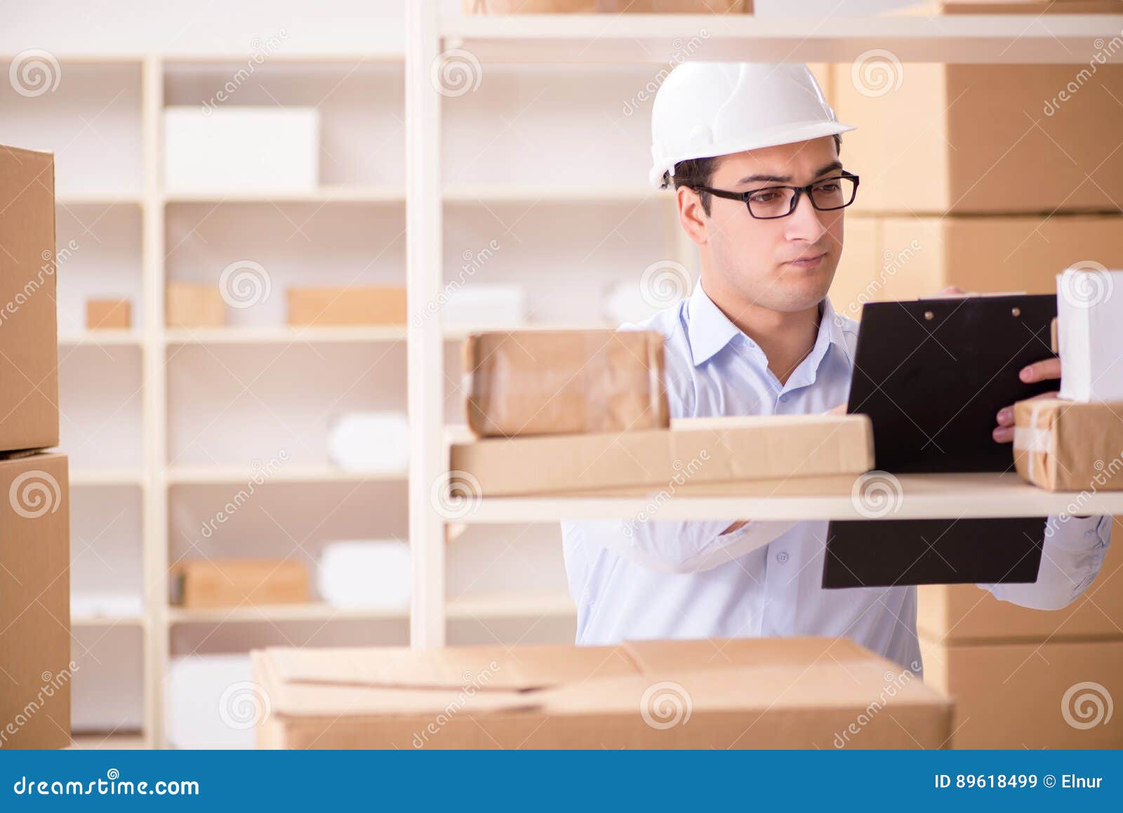 The Man Working in Postal Parcel Delivery Service Office Stock Image ...