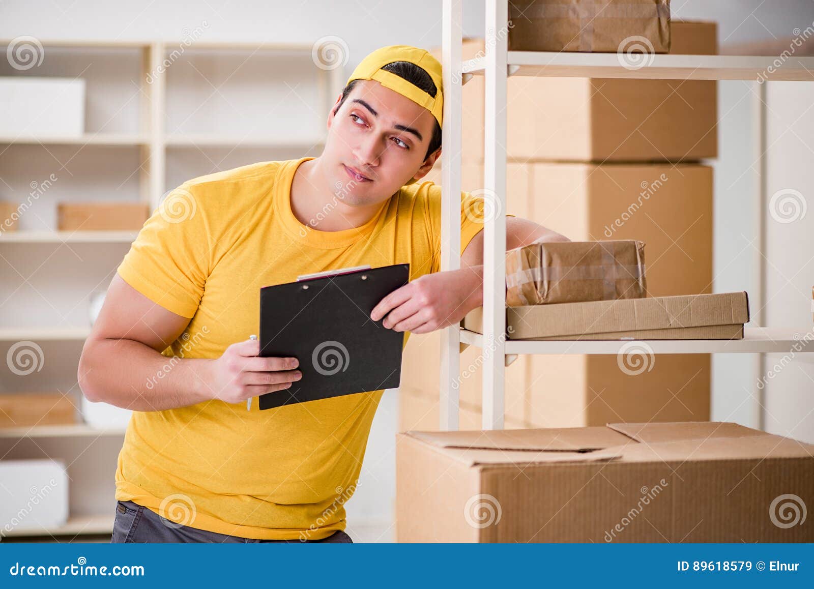The Man Working in Postal Parcel Delivery Service Office Stock Image ...