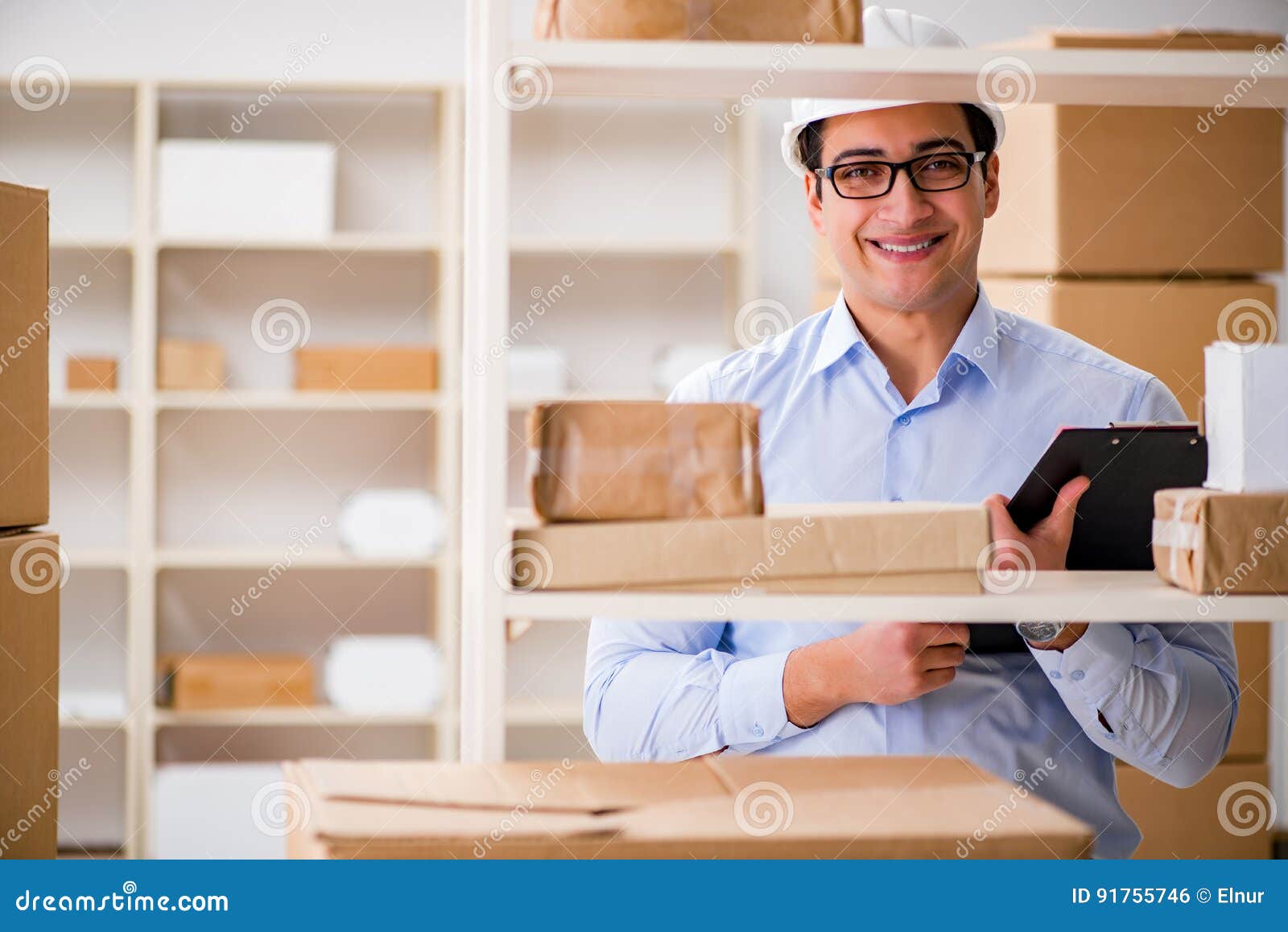 The Man Working in Postal Parcel Delivery Service Office Stock Photo ...