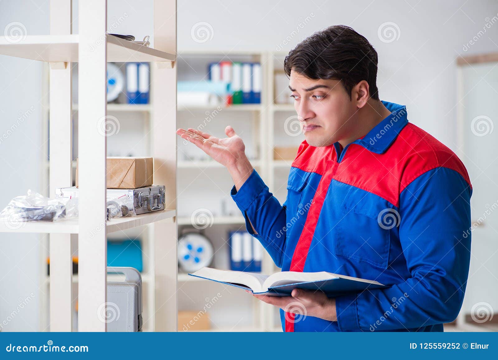 The Man Working in the Postal Warehouse Stock Photo - Image of mailman ...