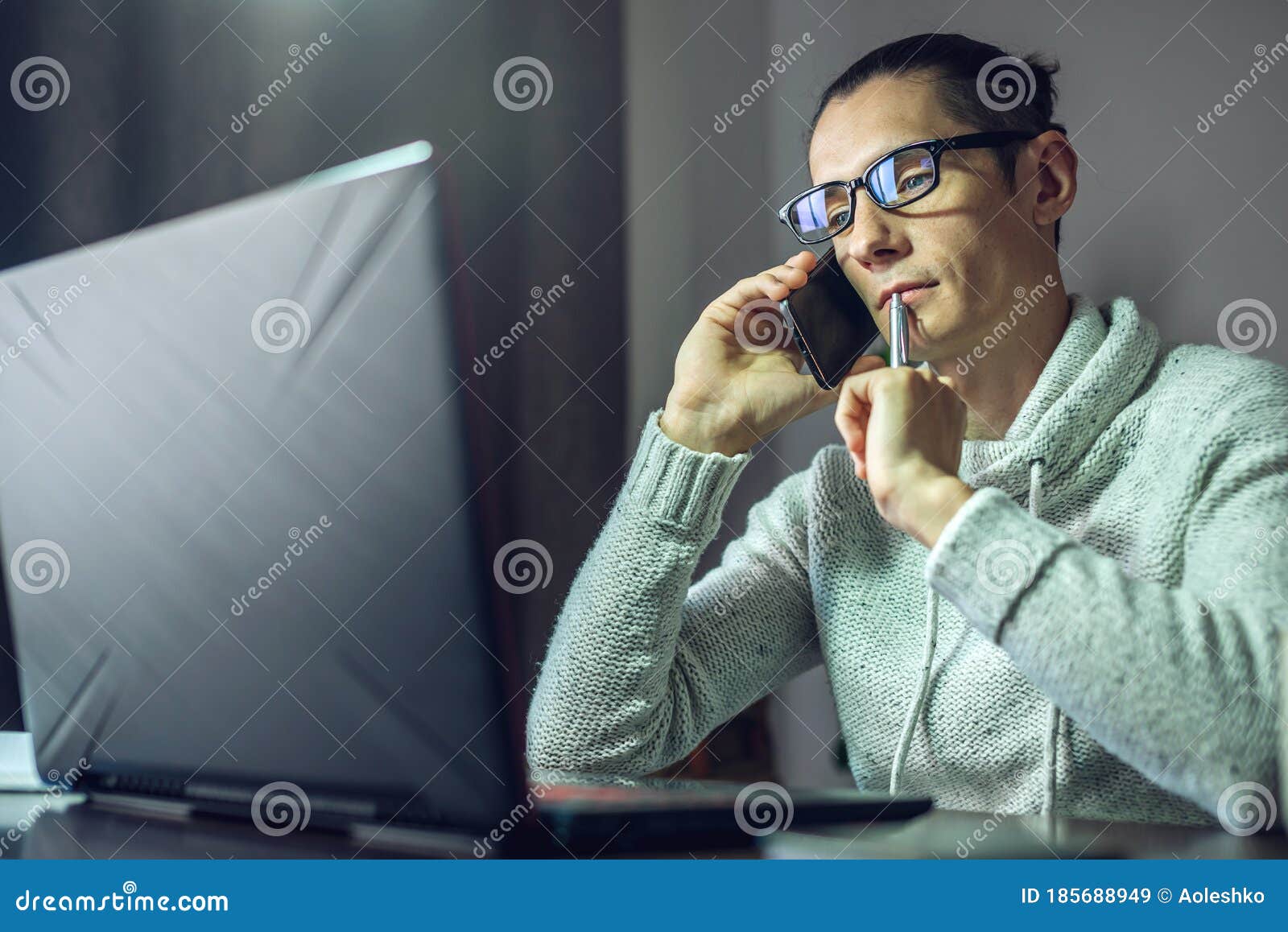 Man is Working Remotely Using a Laptop. a Comfortable and Convenient ...