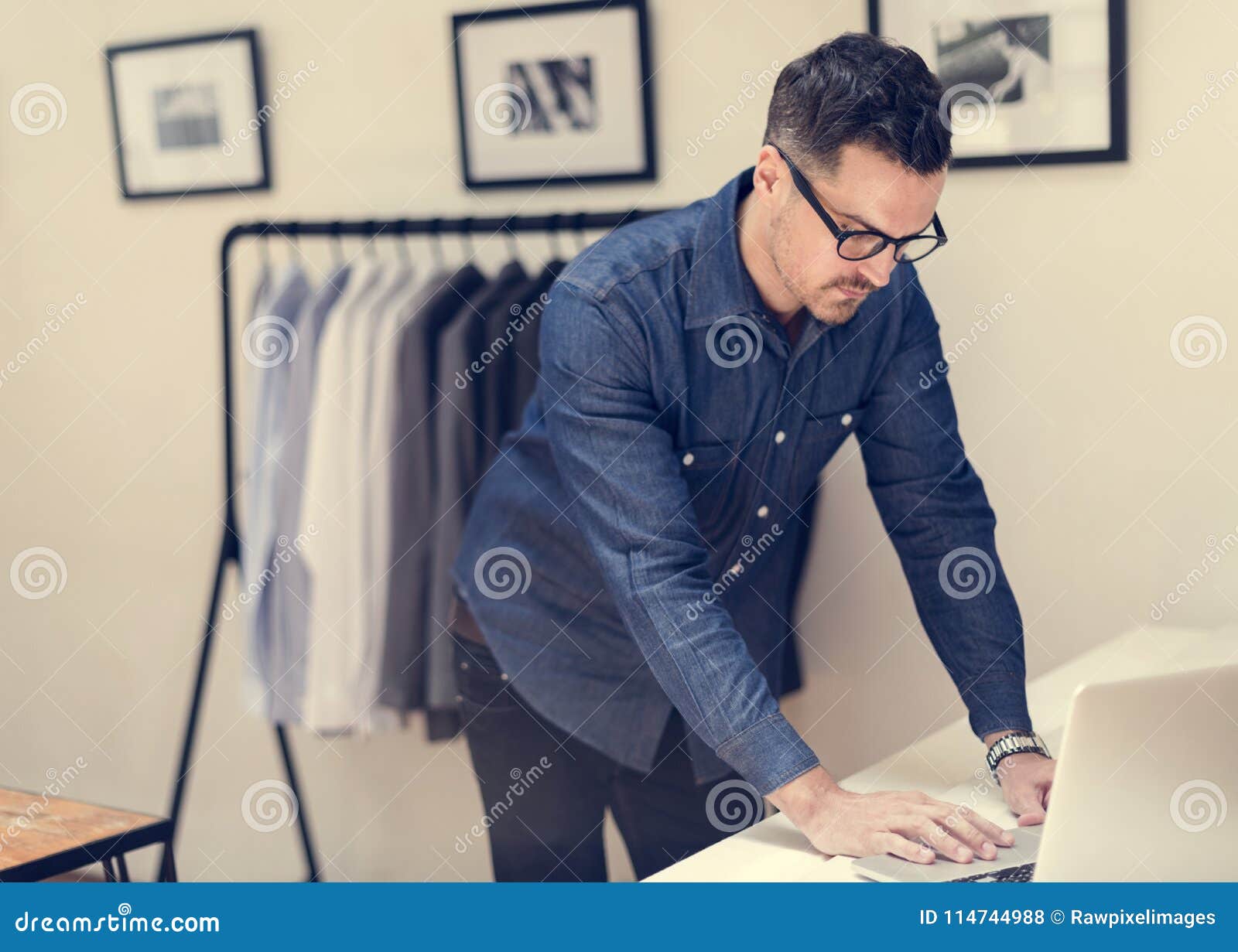 Man Working in Retail Cloth Shop Stock Photo - Image of tailor, cloth ...