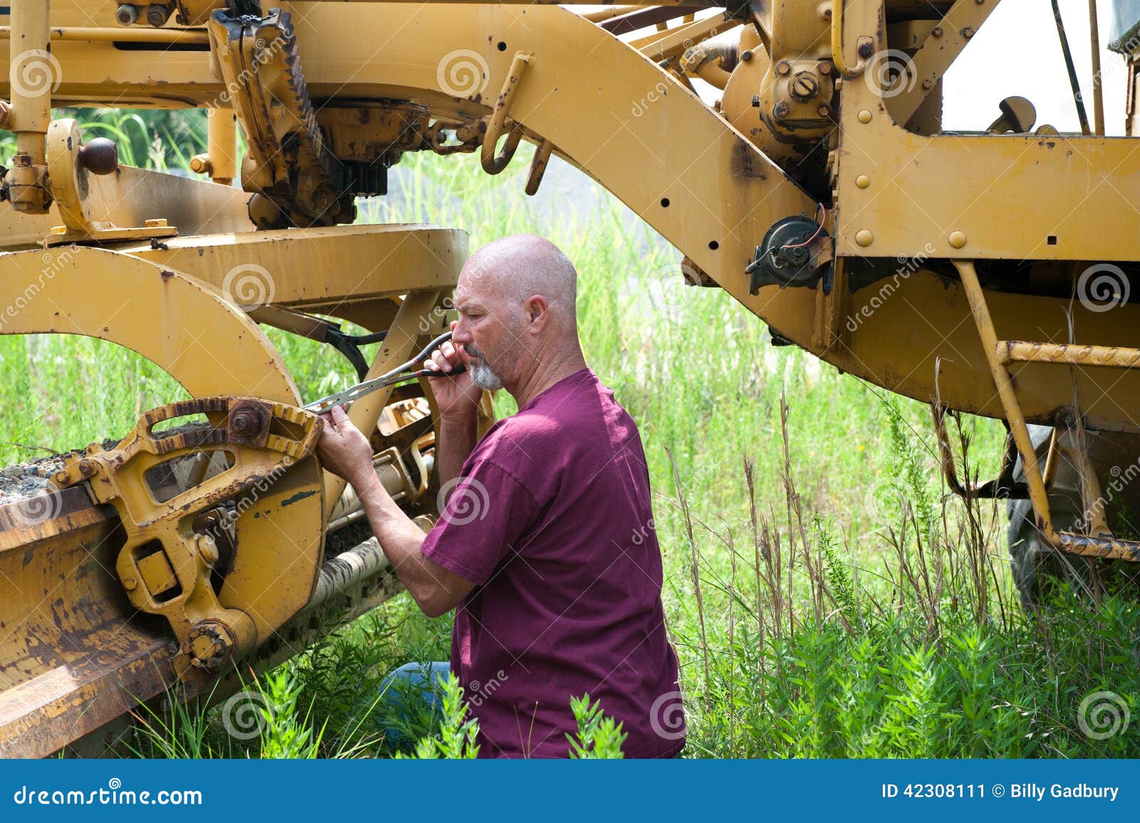 Man Working on Road Equipment Stock Image - Image of industrial ...