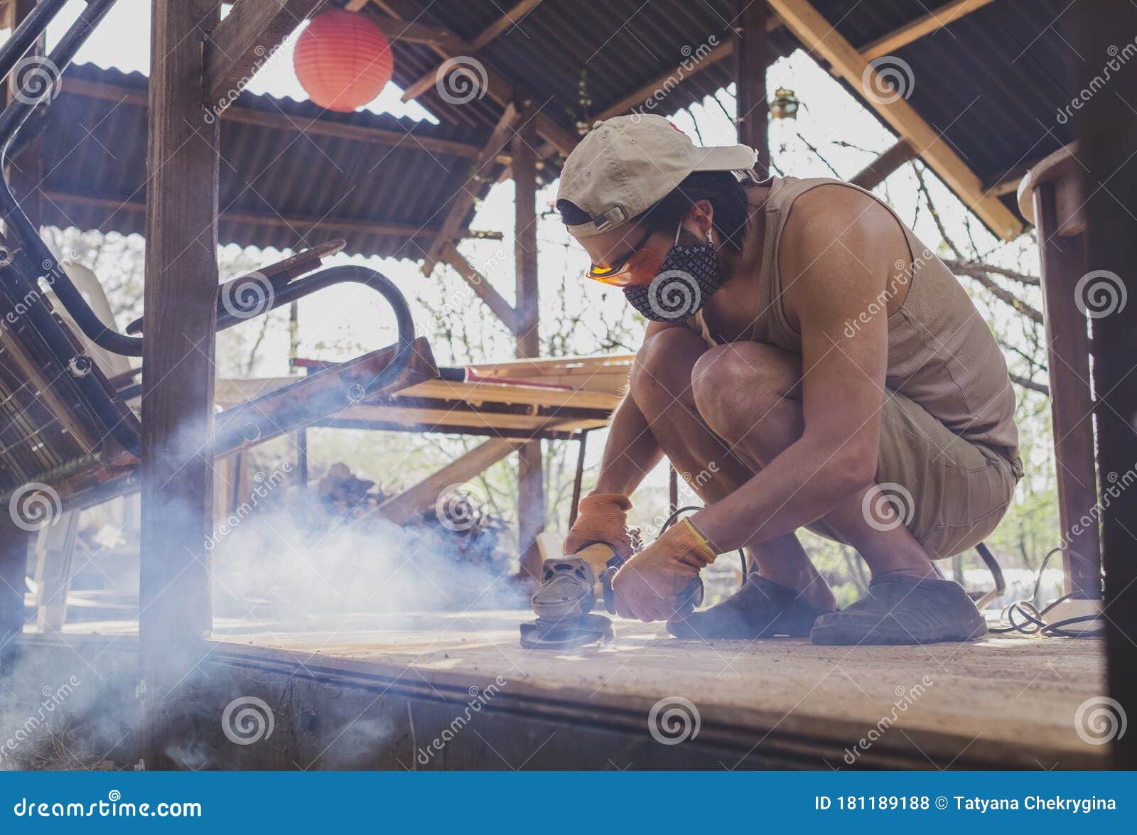 Man Working with Sanding Machine Stock Photo - Image of dust, machine ...
