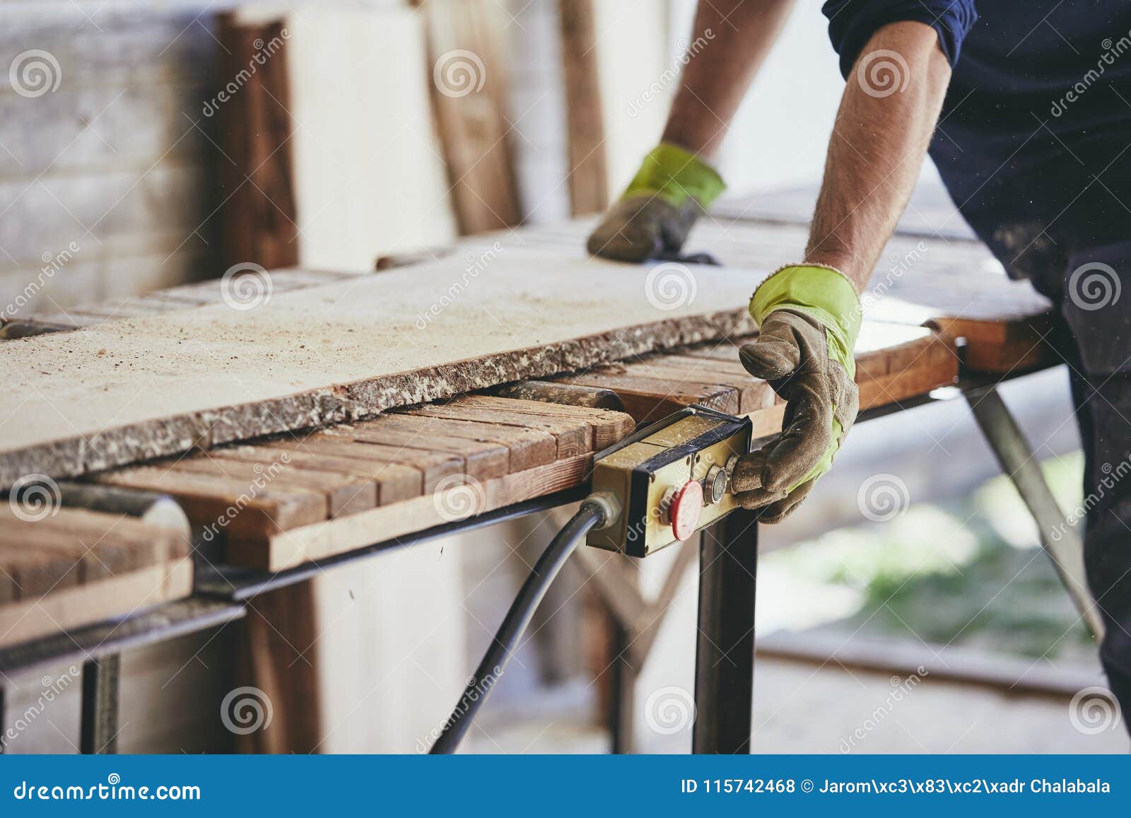 Man working in sawmill stock photo. Image of equipment - 115742468