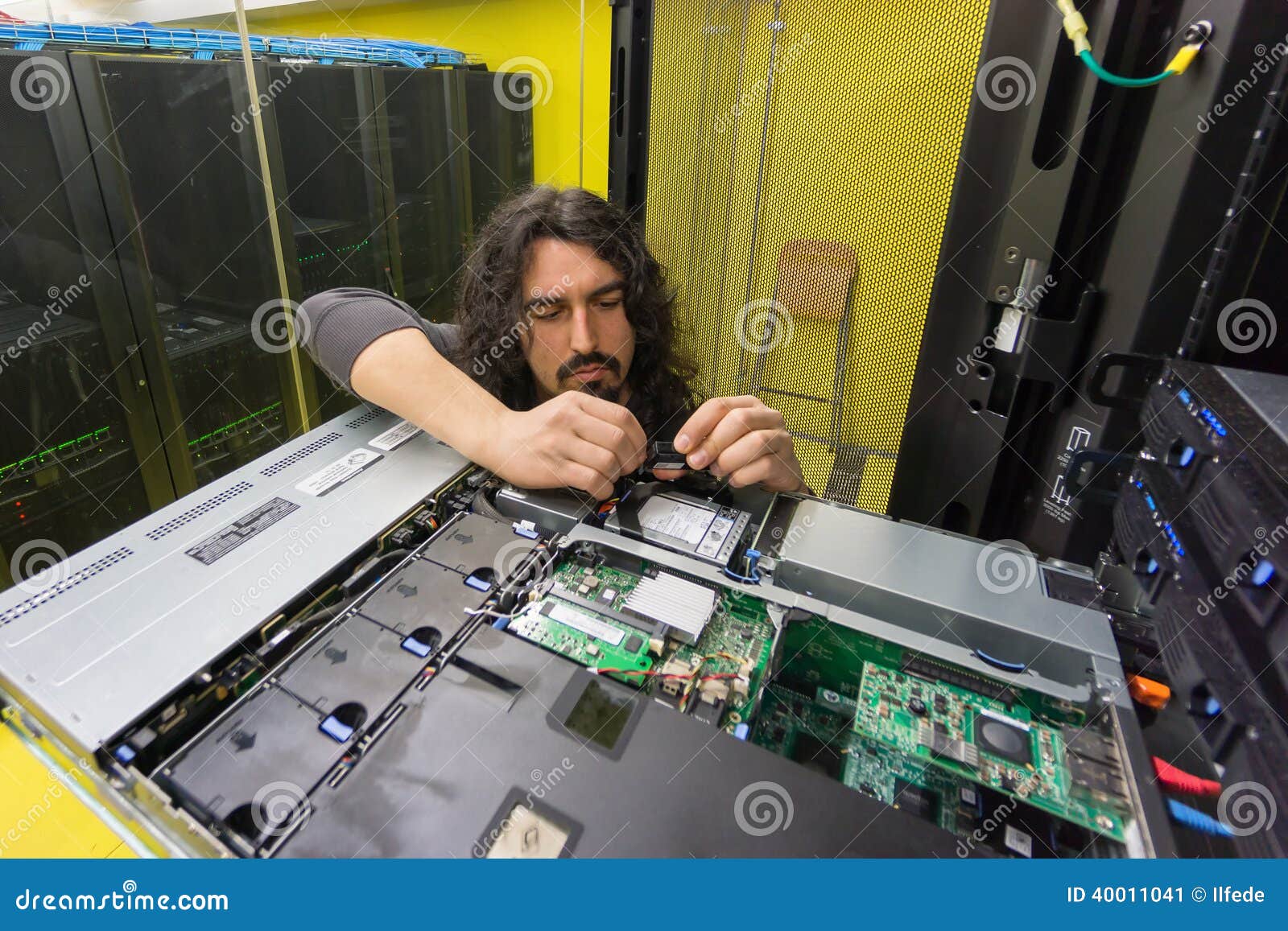 Man Working with Server in Data Center Stock Image - Image of ... Man Working with Server in Data Center Stock Image - Image of ...