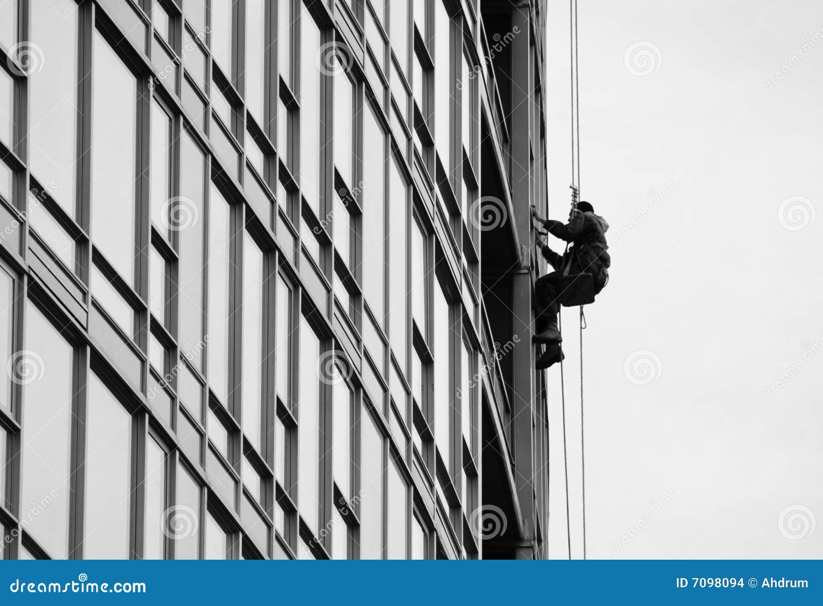 Man Working on Skyscraper stock photo. Image of downtown - 7098094
