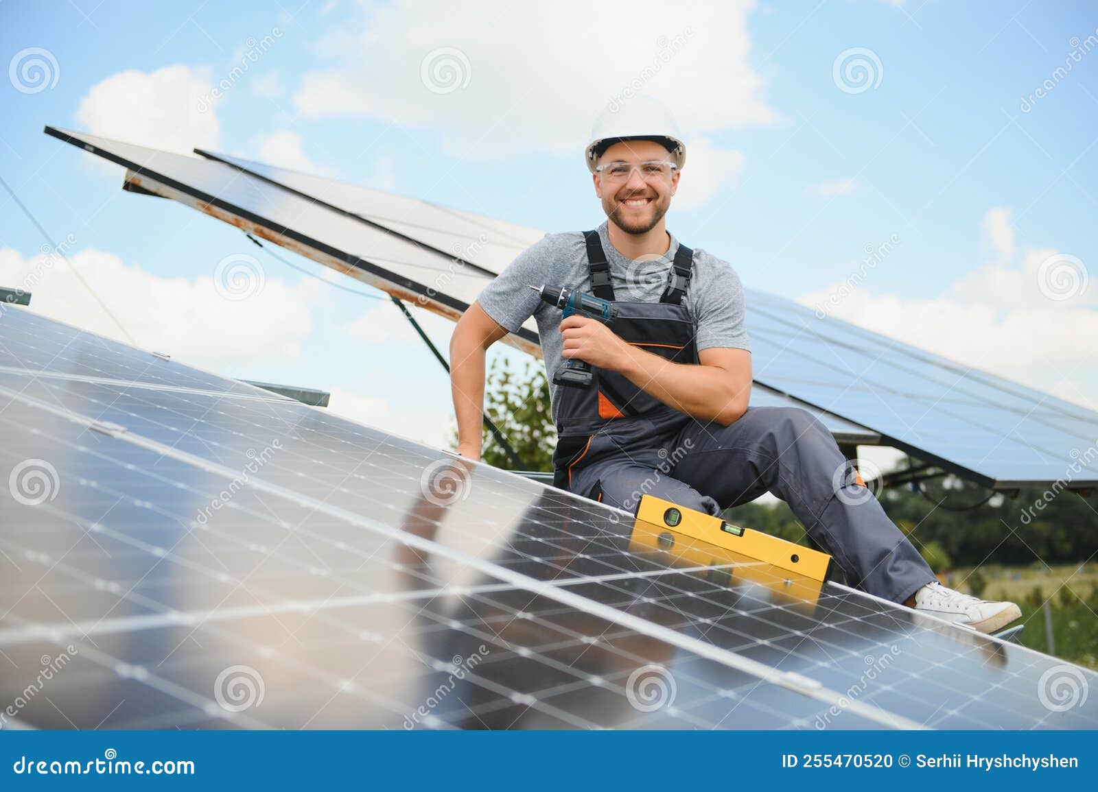 A Man Working at Solar Power Station. Stock Photo - Image of technology ...